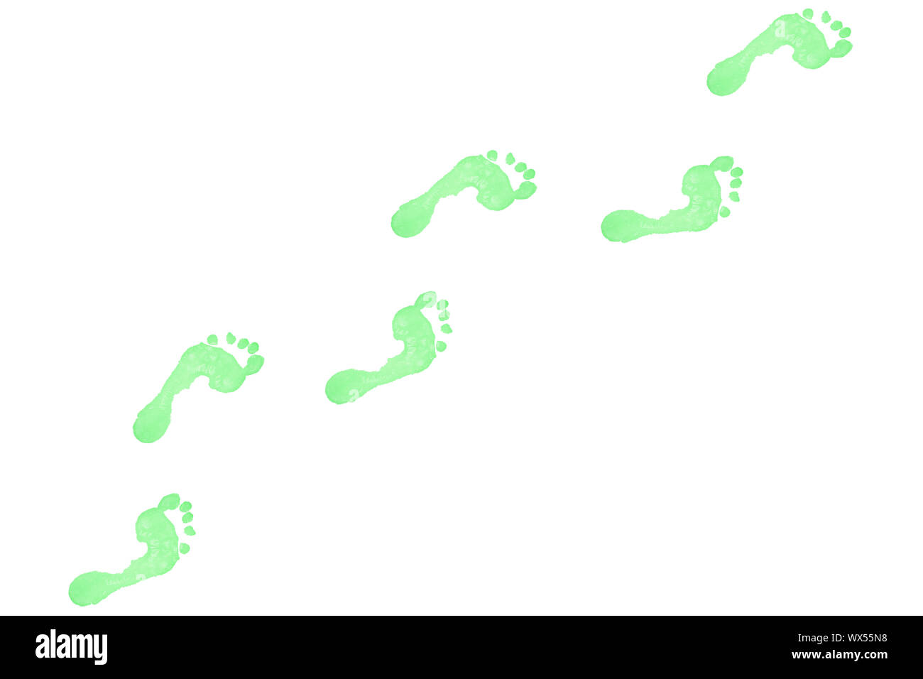 Six green footprints against a white background Stock Photo - Alamy