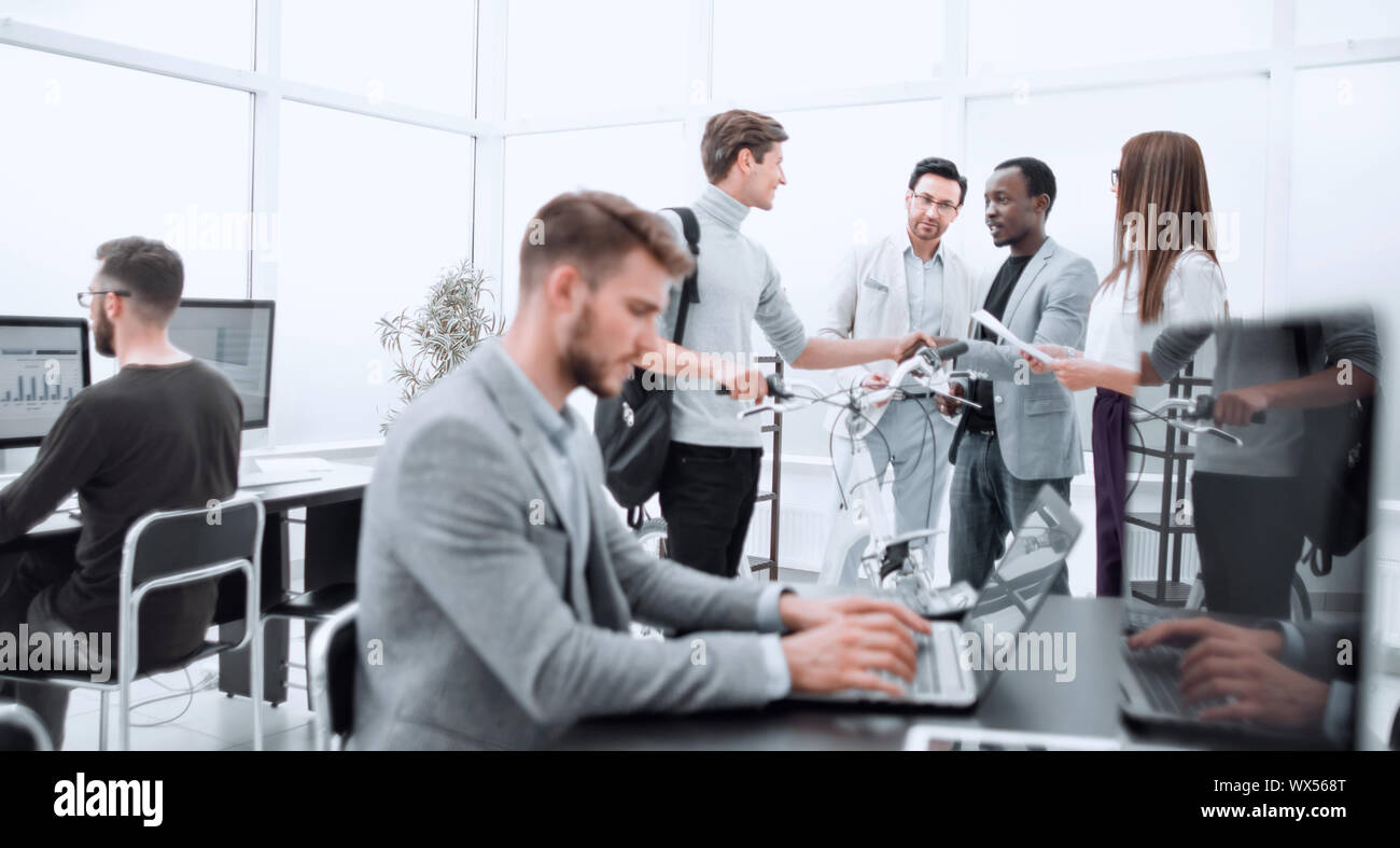 employees working on computers in the office Stock Photo - Alamy