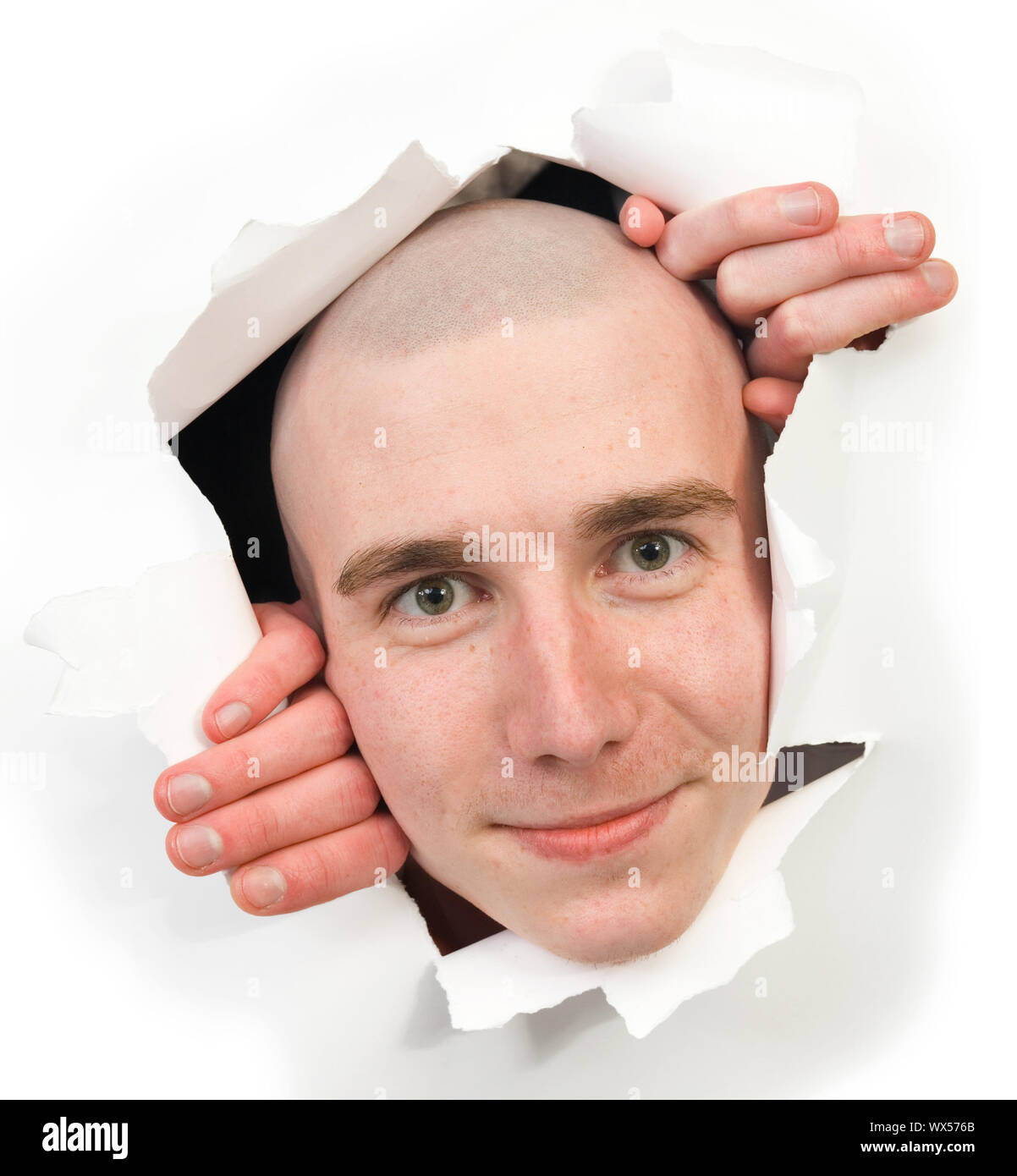 Person put out from sheet of paper on the white background Stock Photo ...