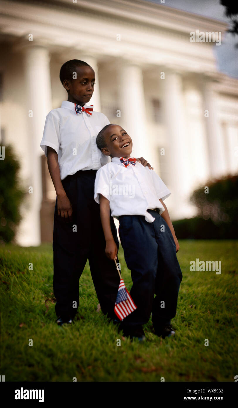 Two boys in formal wear having fun Stock Photo - Alamy