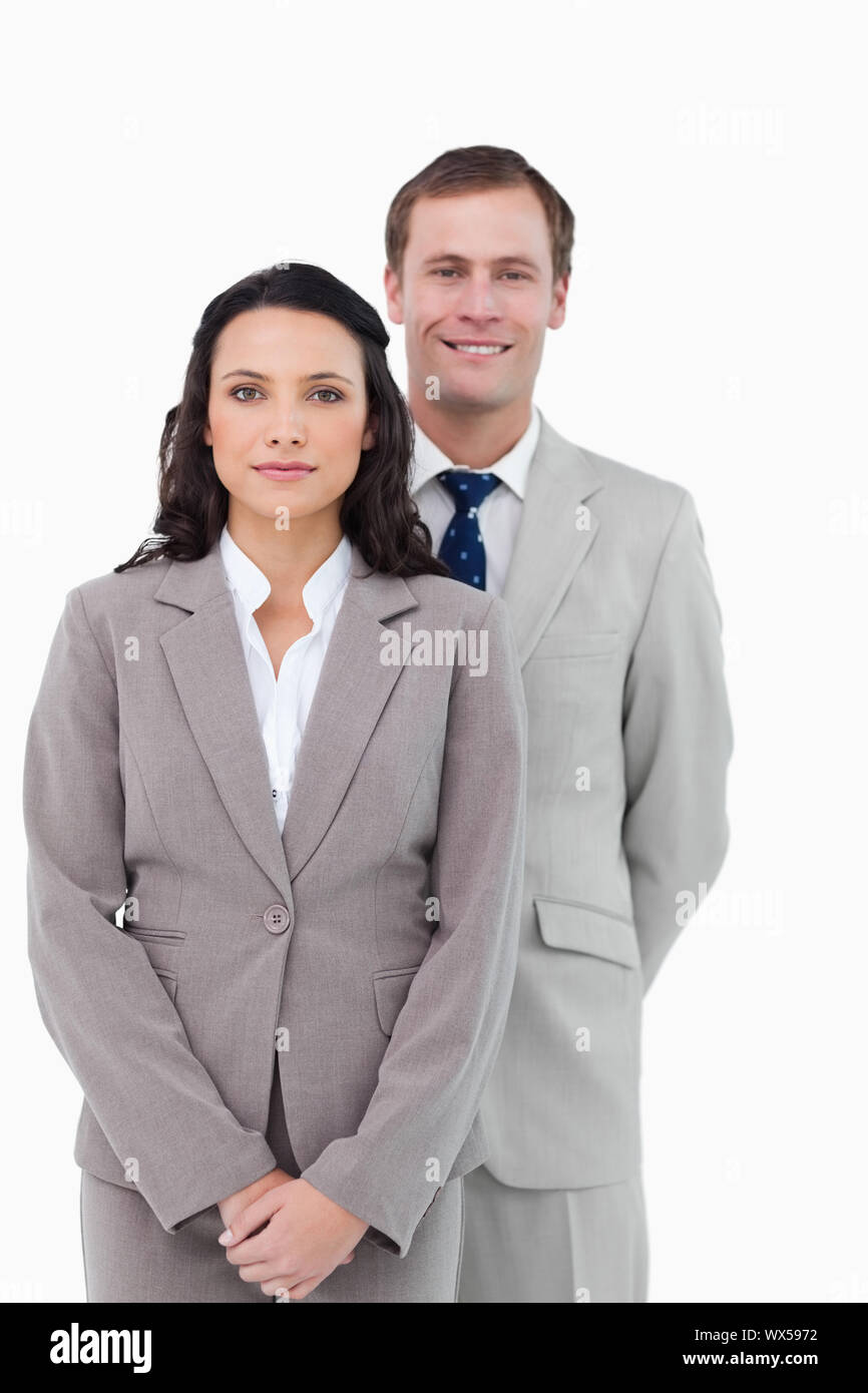 Office staff standing together against a white background Stock Photo ...