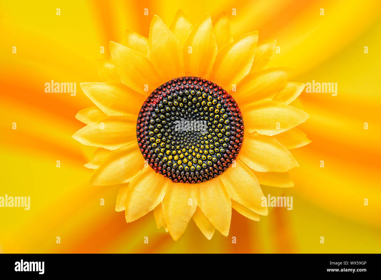 Large yellow artificial sunflower fan Stock Photo - Alamy