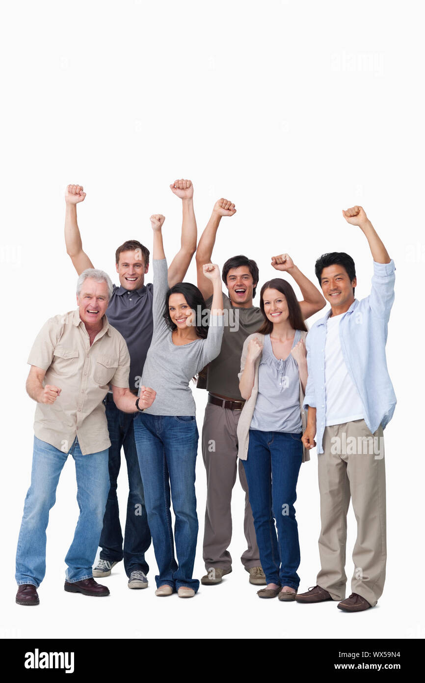 Cheering group of people against a white background Stock Photo - Alamy