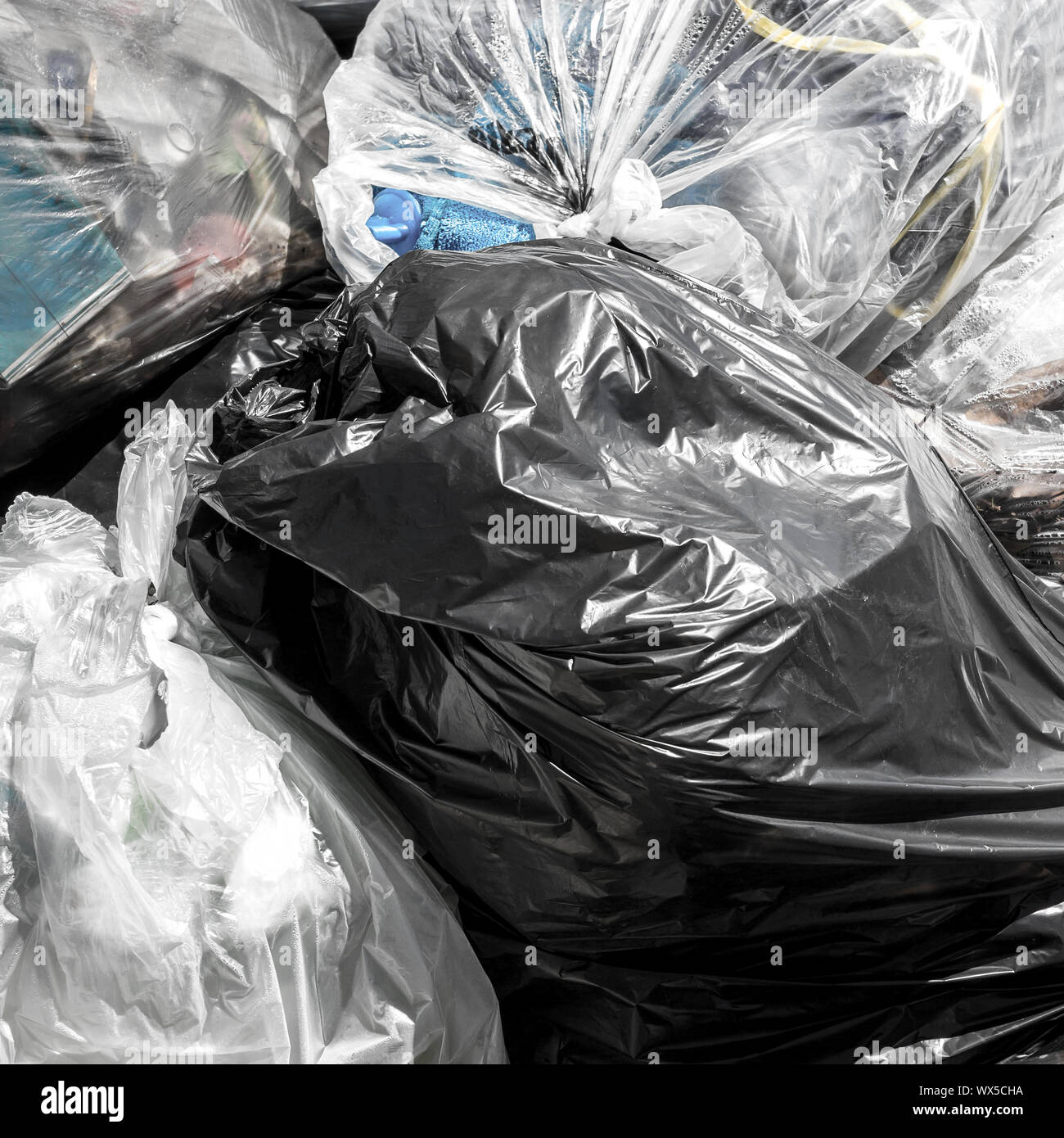 Tied black bin bags hi-res stock photography and images - Alamy