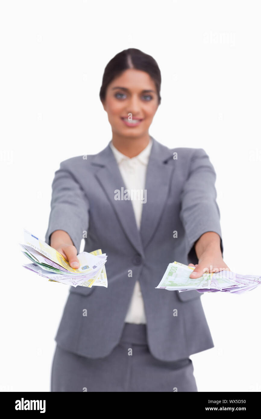 Woman handing cash over hi-res stock photography and images - Alamy