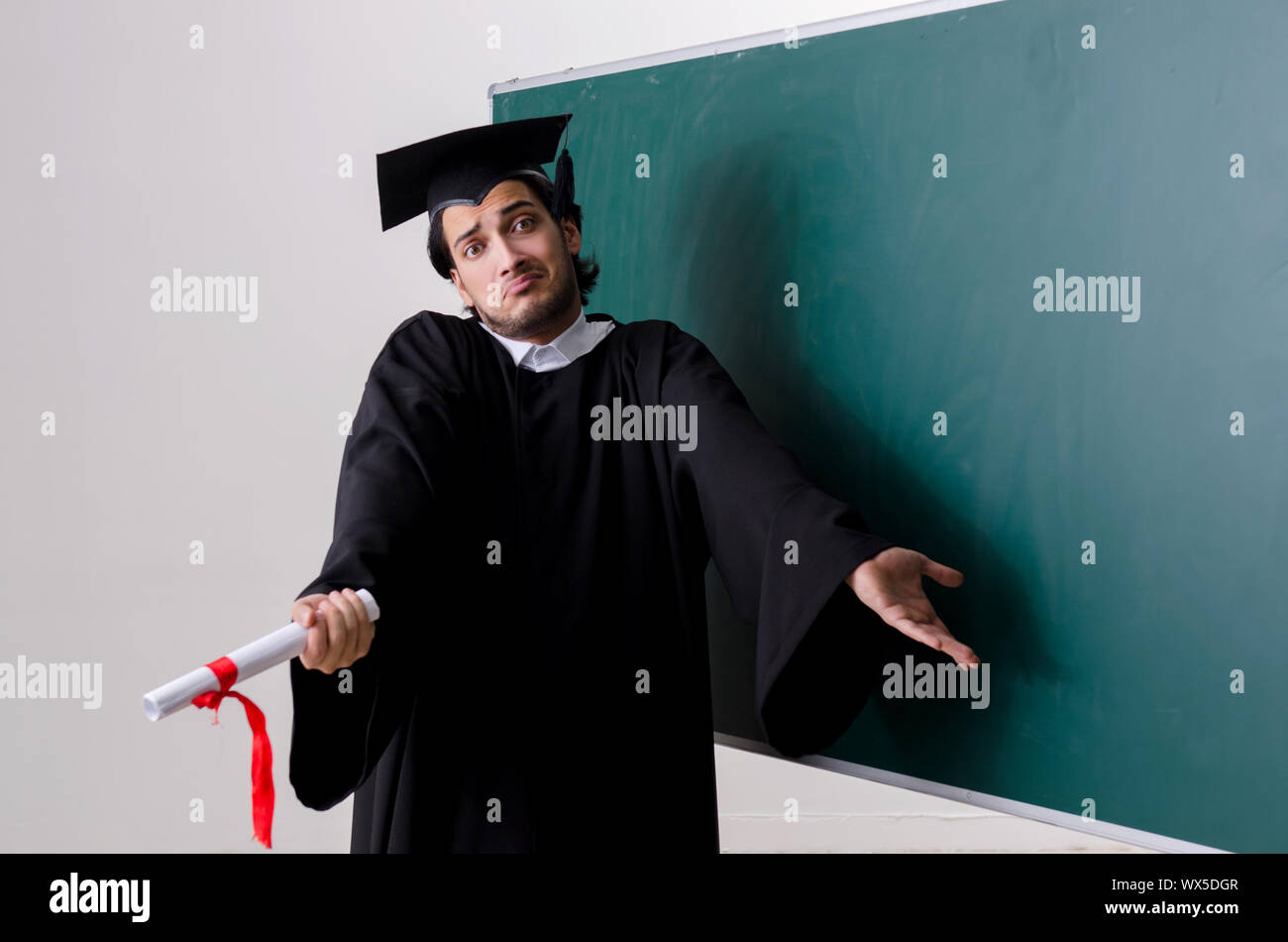 Sad graduate student diploma hi-res stock photography and images - Alamy