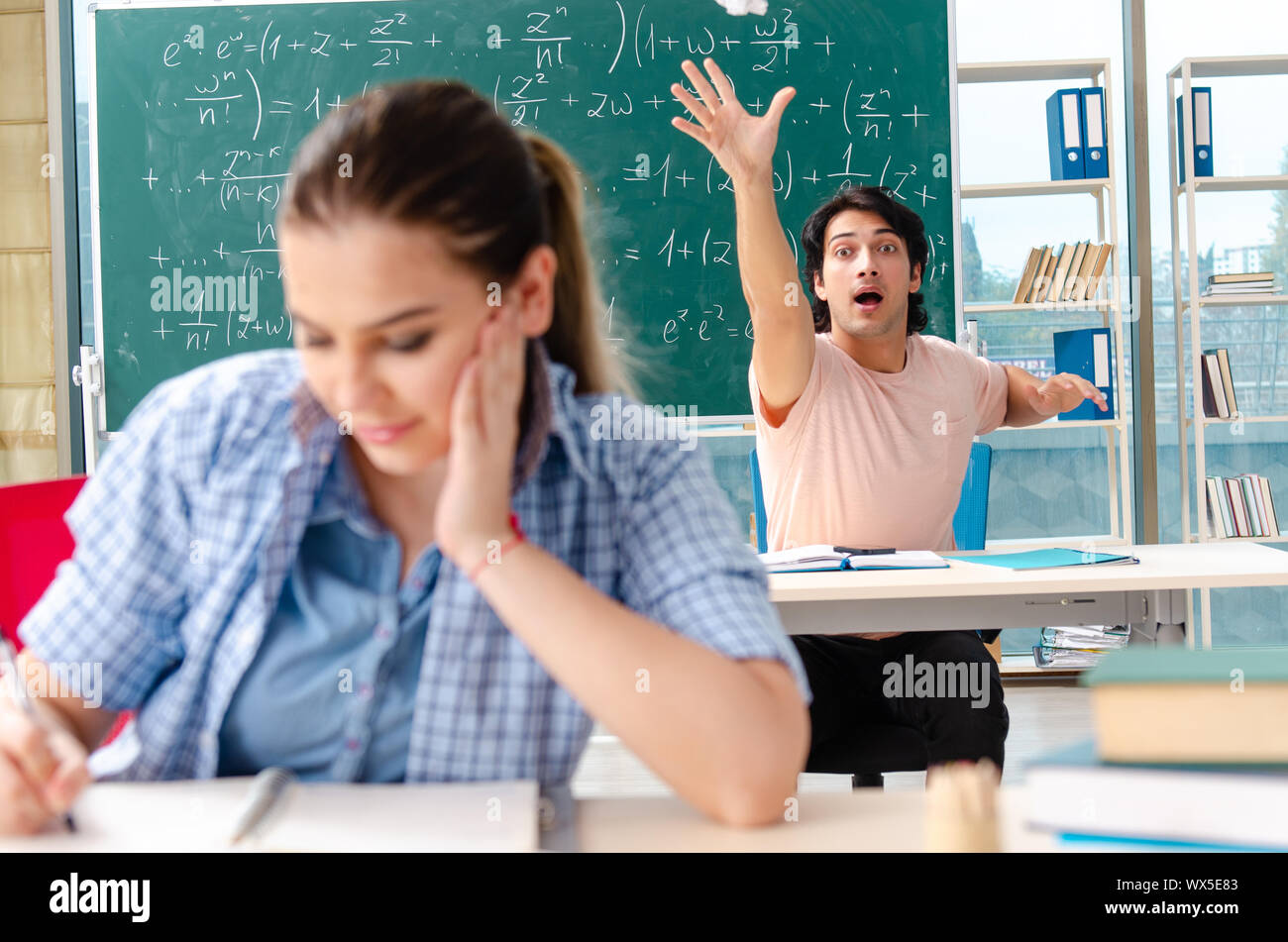 Young students taking the math exam in classroom Stock Photo - Alamy