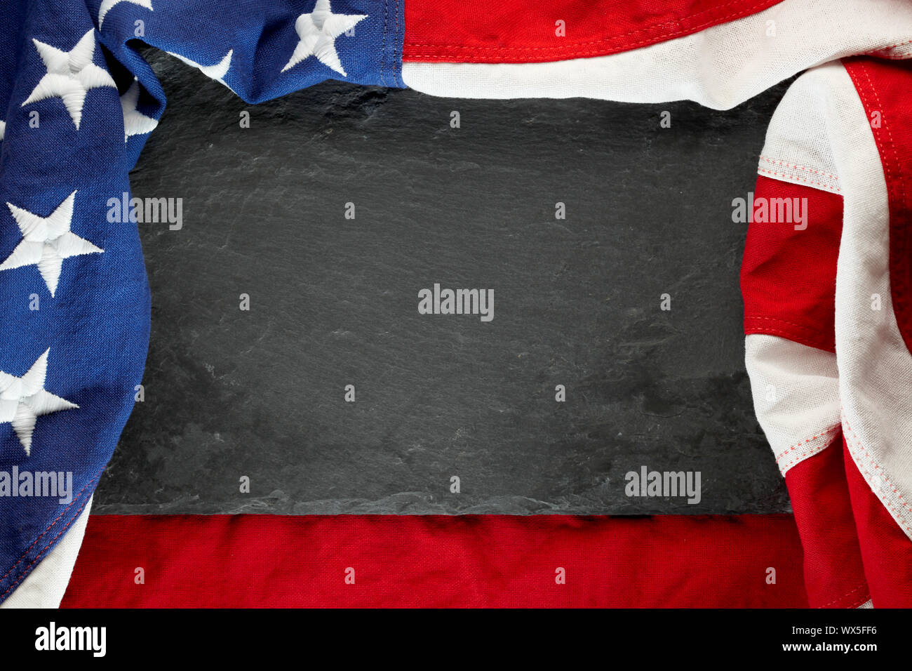 US American flag on black slate stone background. For USA Memorial day ...
