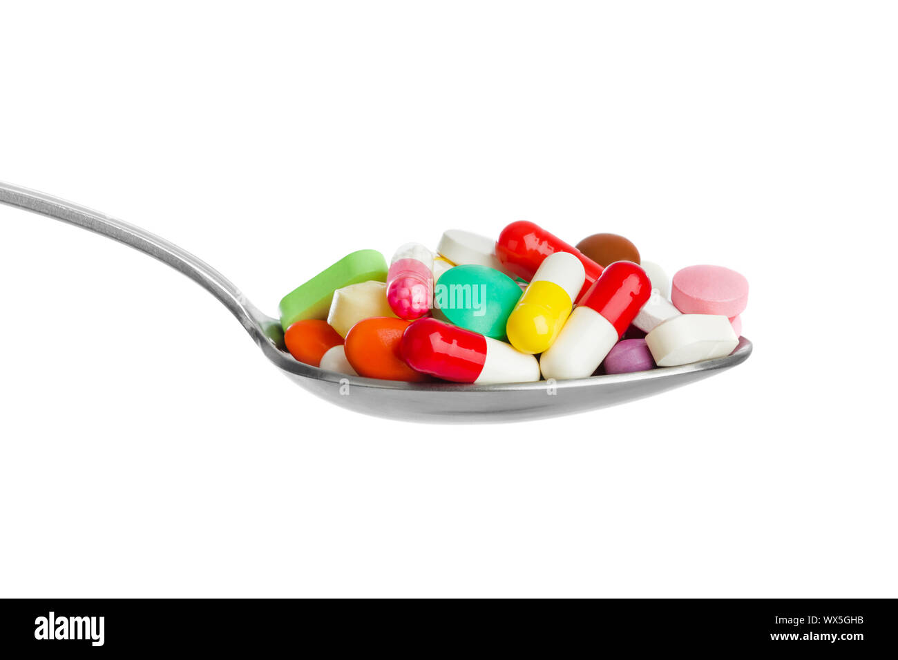 Hand holding stack of tablets Cut Out Stock Images & Pictures - Alamy