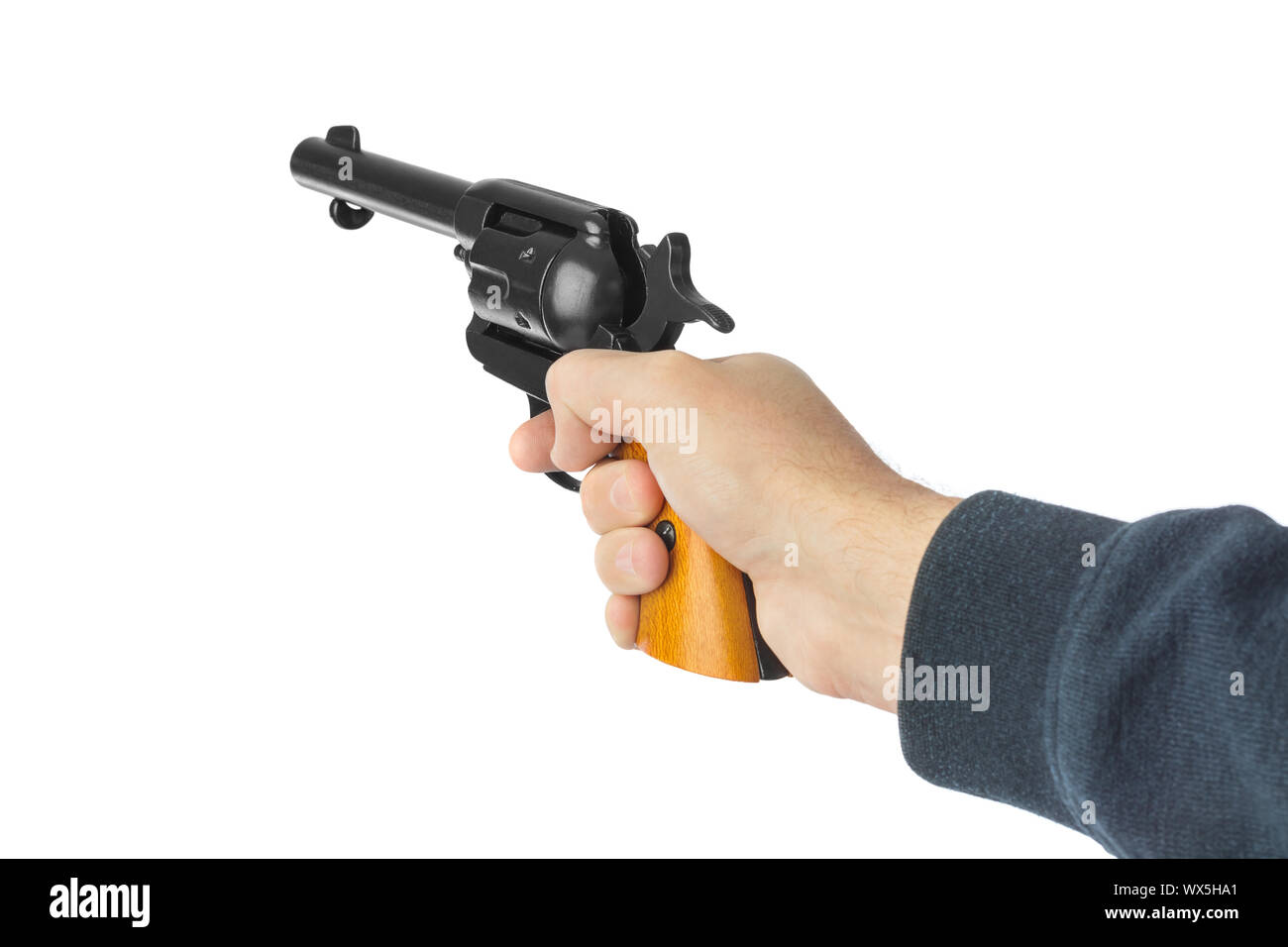 Hand with revolver Stock Photo - Alamy