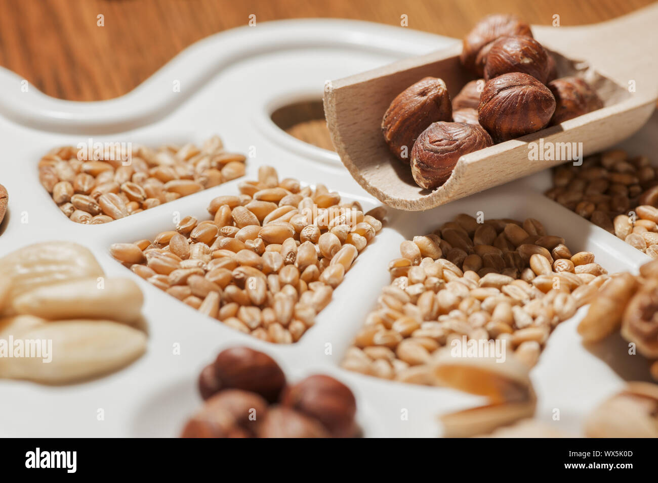 Artist pallet nuts and grains Stock Photo - Alamy