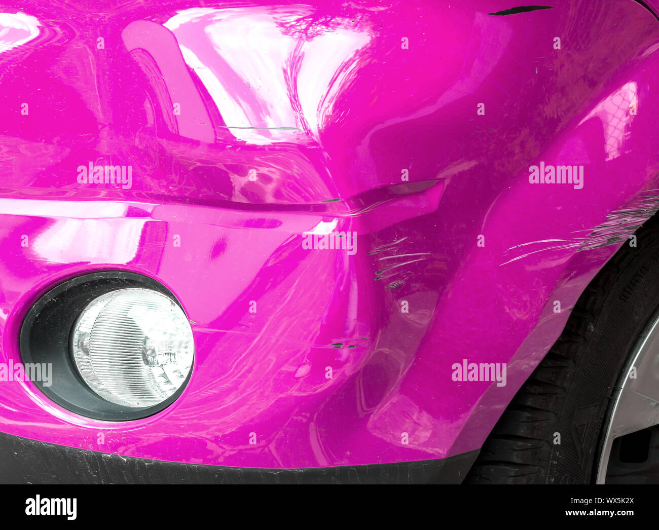 Pink car damaged Stock Photo - Alamy