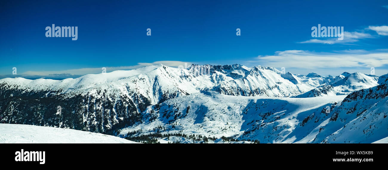 panorama of snowy mountains Stock Photo - Alamy