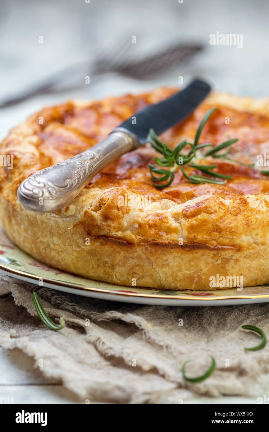 Traditional French closed pie with potatoes Stock Photo - Alamy