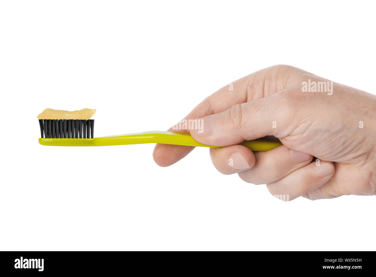 Hand with toothbrush Stock Photo - Alamy