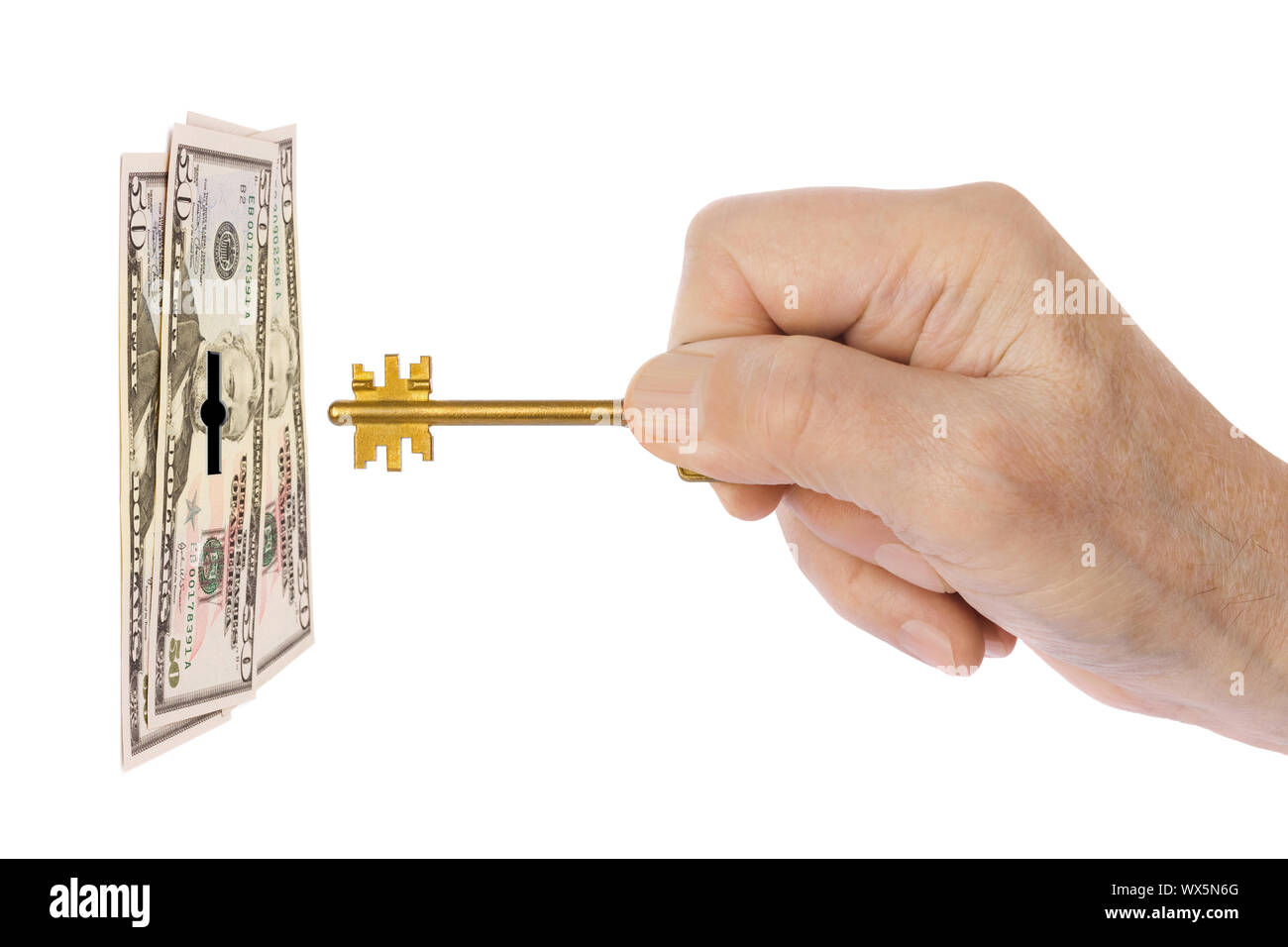 Hand with key and money Stock Photo - Alamy