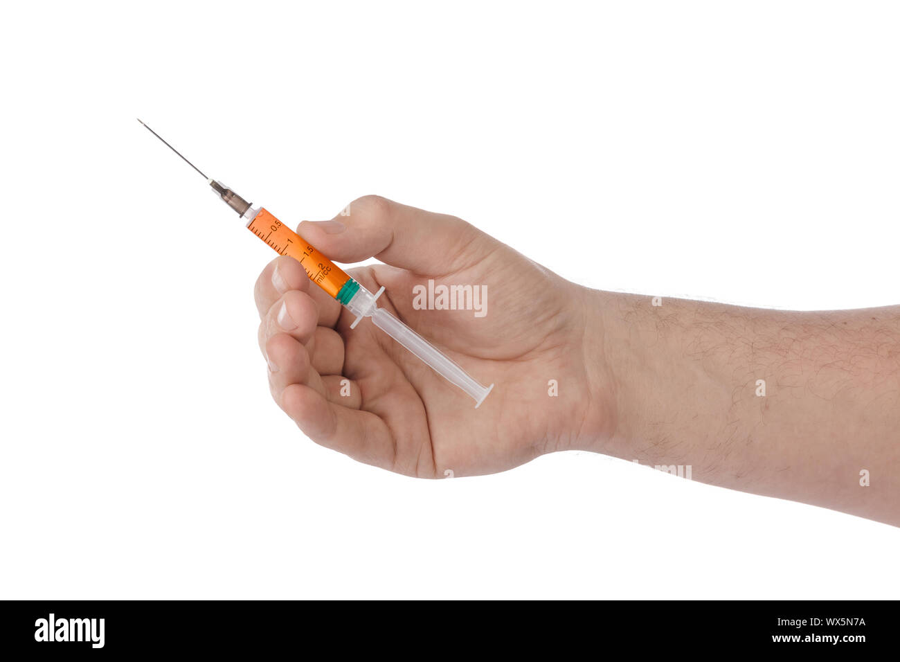 Syringe in hand Stock Photo - Alamy