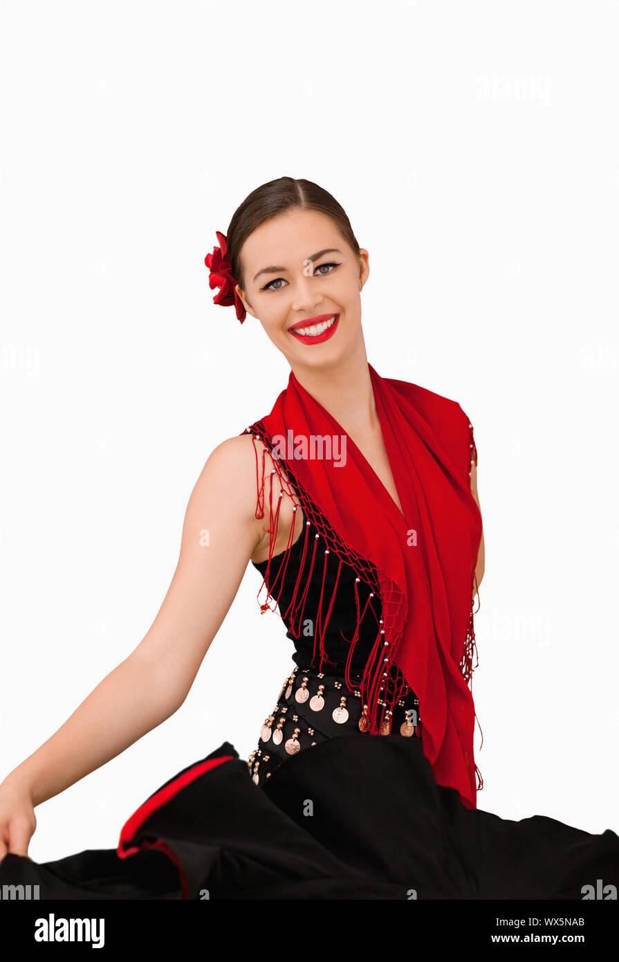 Smiling female dancer against a white background Stock Photo - Alamy