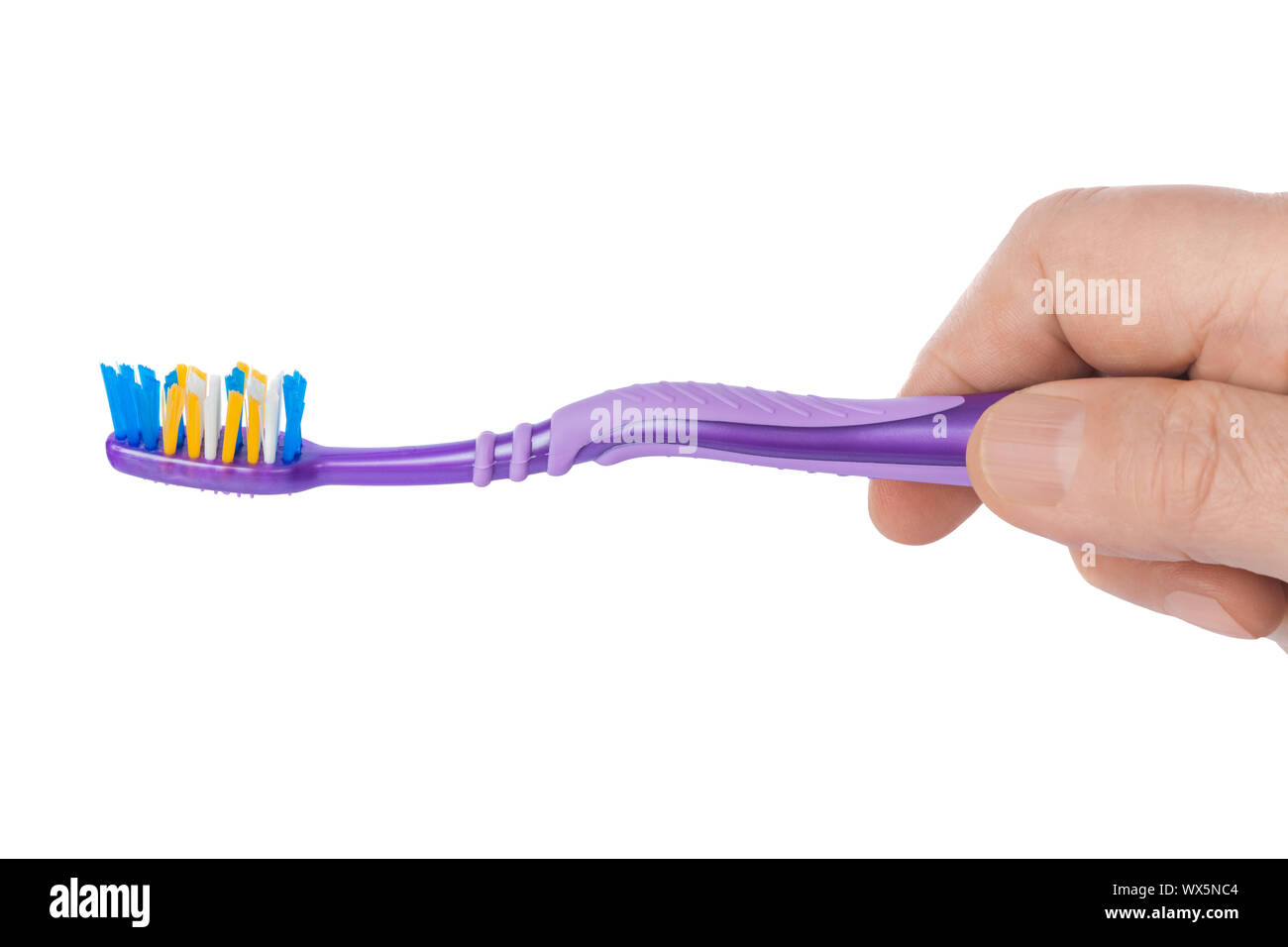 Hand with toothbrush Stock Photo - Alamy