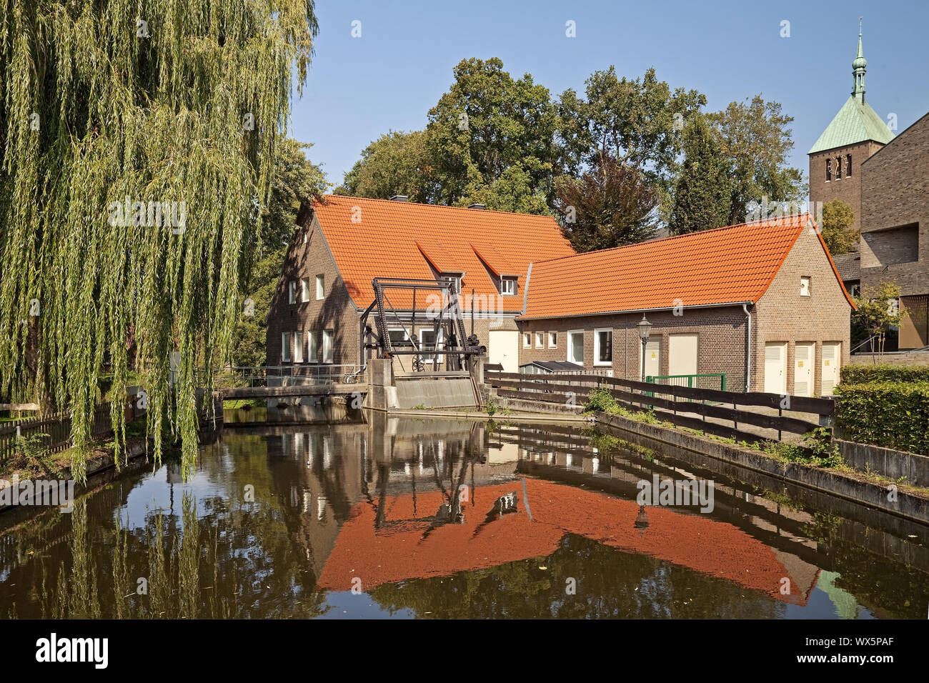 park and watergate of river Berkel and St Georg church, Vreden ...