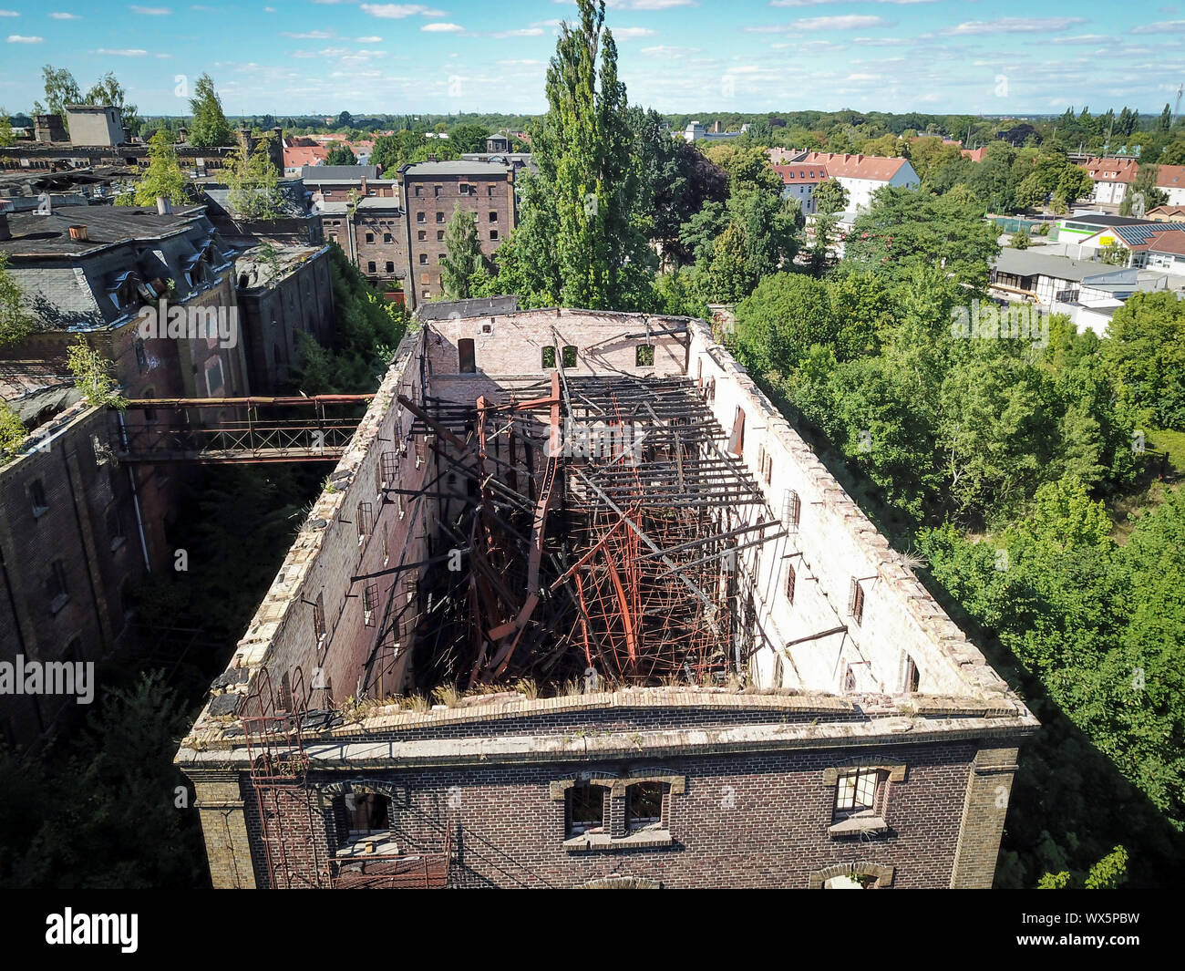 look into a collapsed factory Stock Photo - Alamy