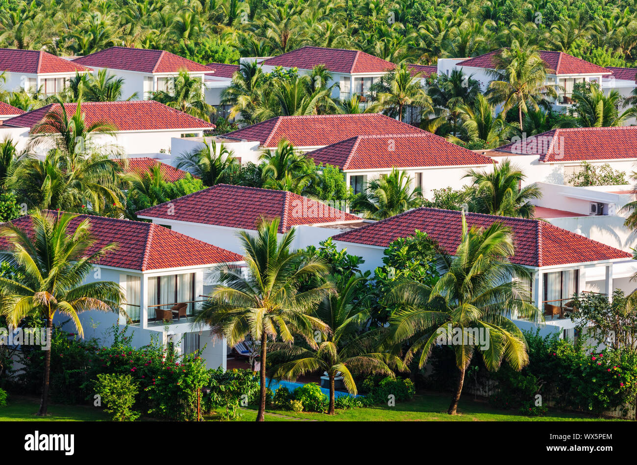 beautiful white villas and palm Stock Photo - Alamy