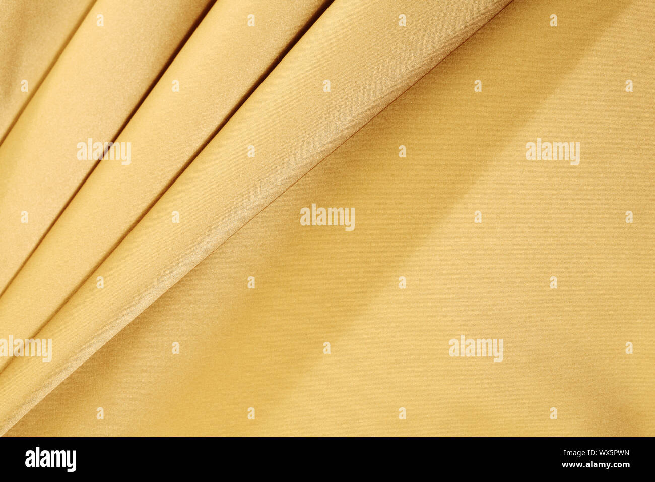 gold textile background close up Stock Photo - Alamy