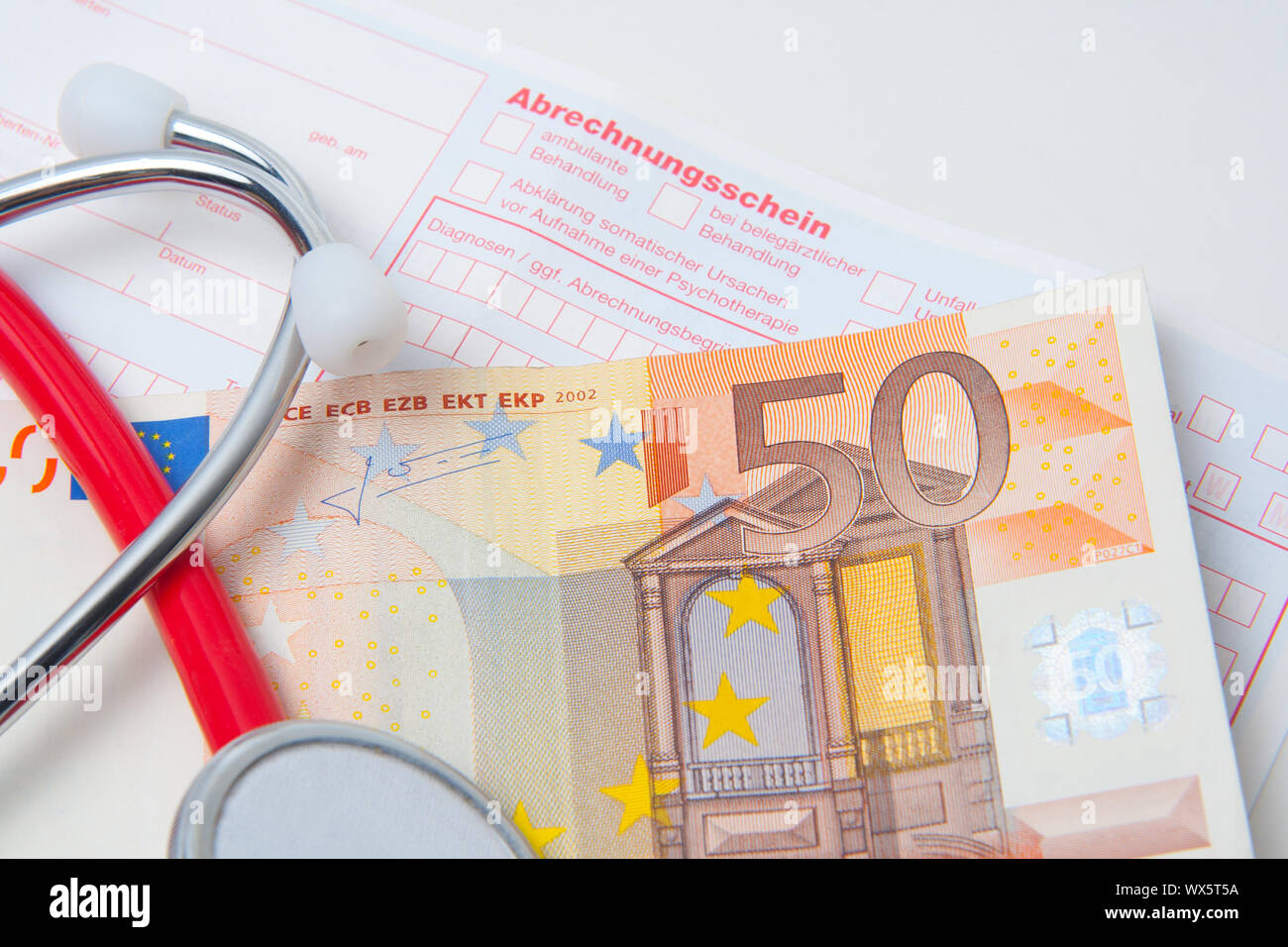 stethoscope and european currency on a german medical bill Stock Photo ...