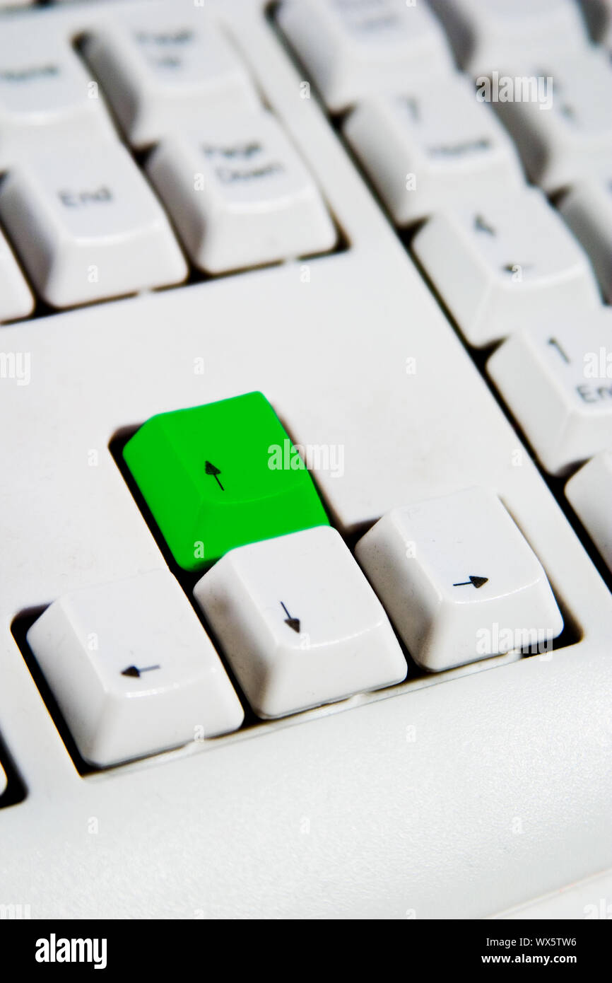 Arrow keys on a desktop computer keyboard with the up arrow green Stock ...