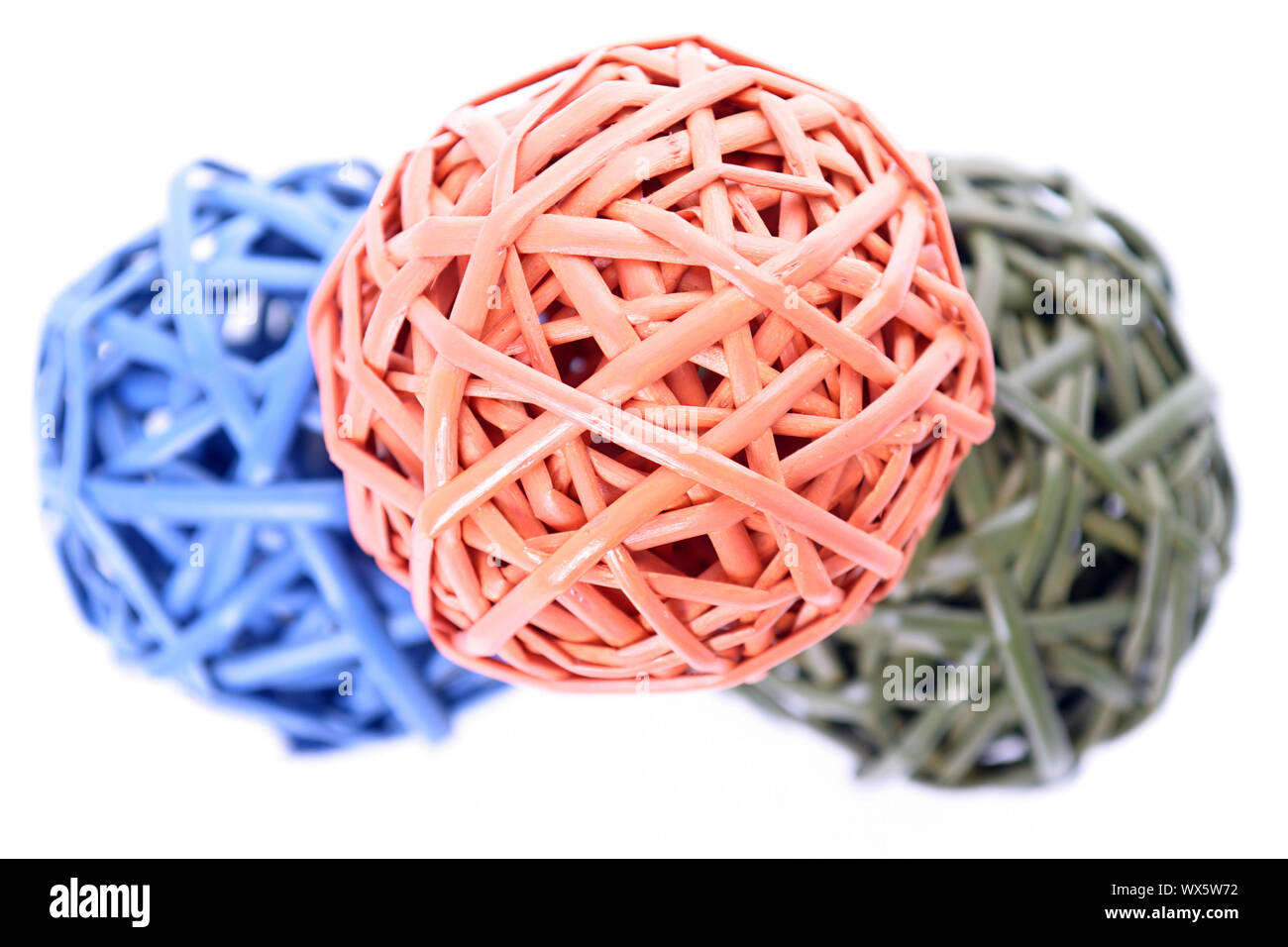 Colorful woven balls isolated on a white background Stock Photo - Alamy