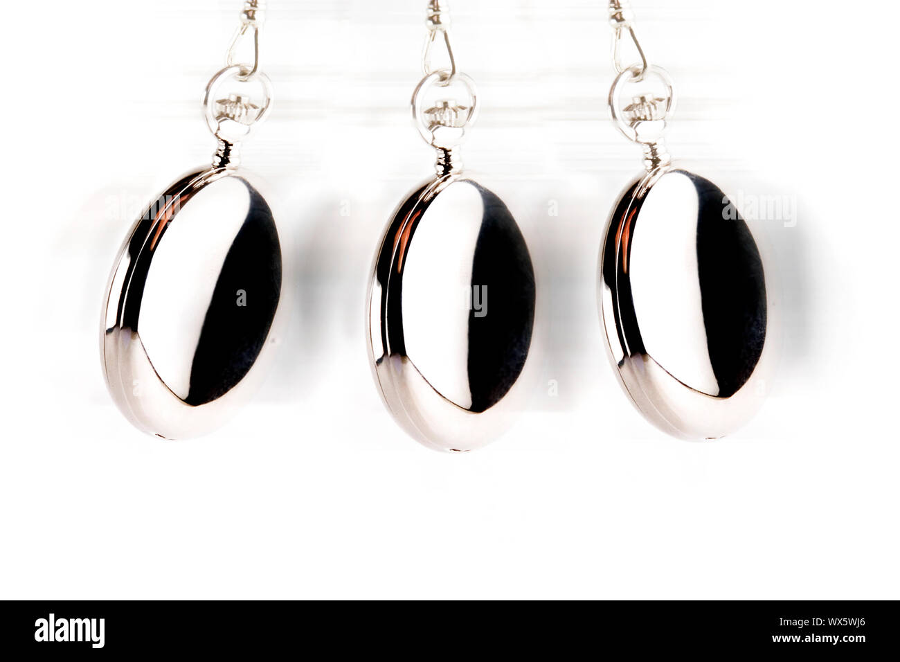 A pocket watch moving back and forth (motion blur Stock Photo - Alamy