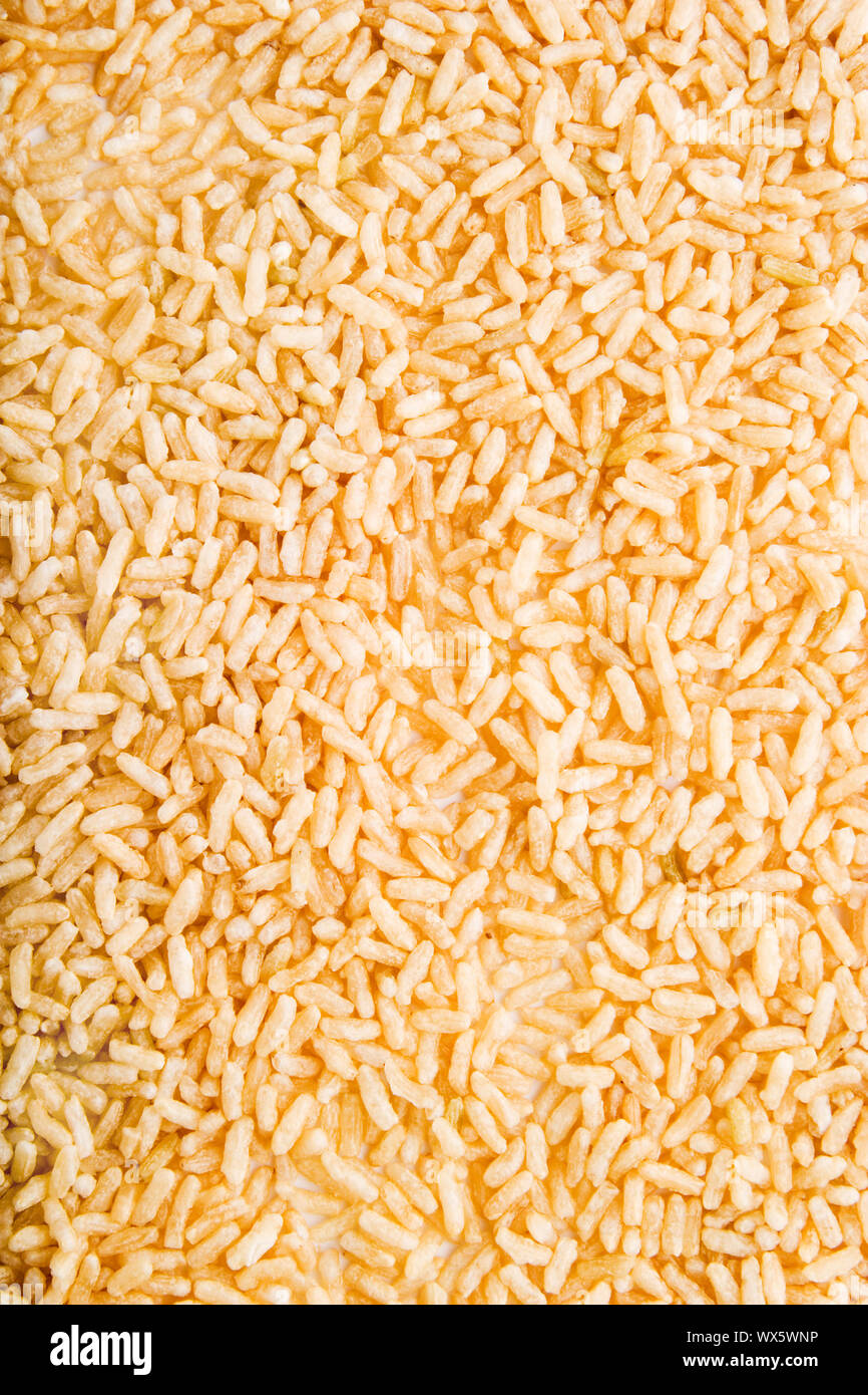Bulk whole grain instant cooking rice background texture Stock Photo ...