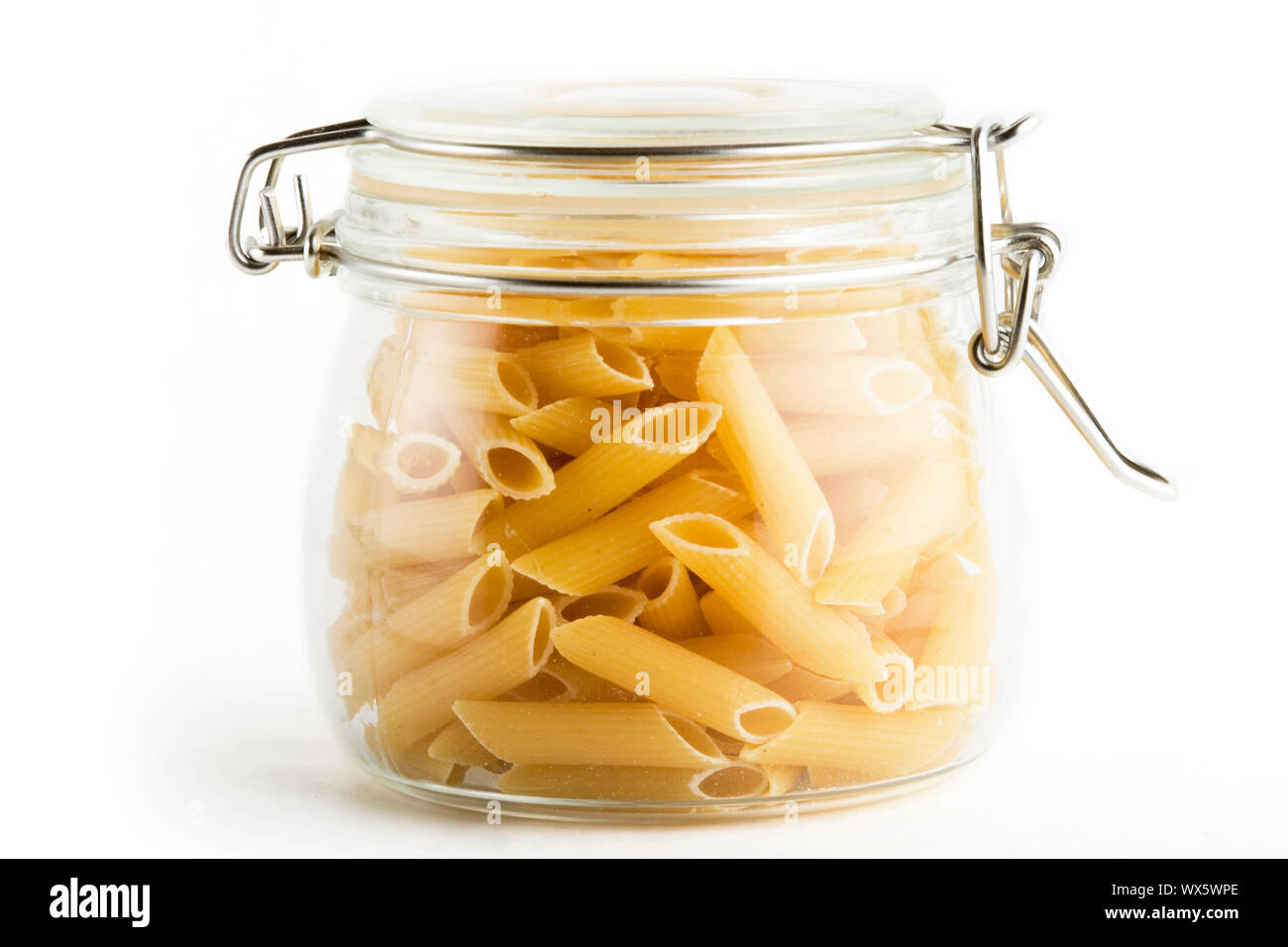 Penne Rigate pasta in a glass jar Stock Photo - Alamy
