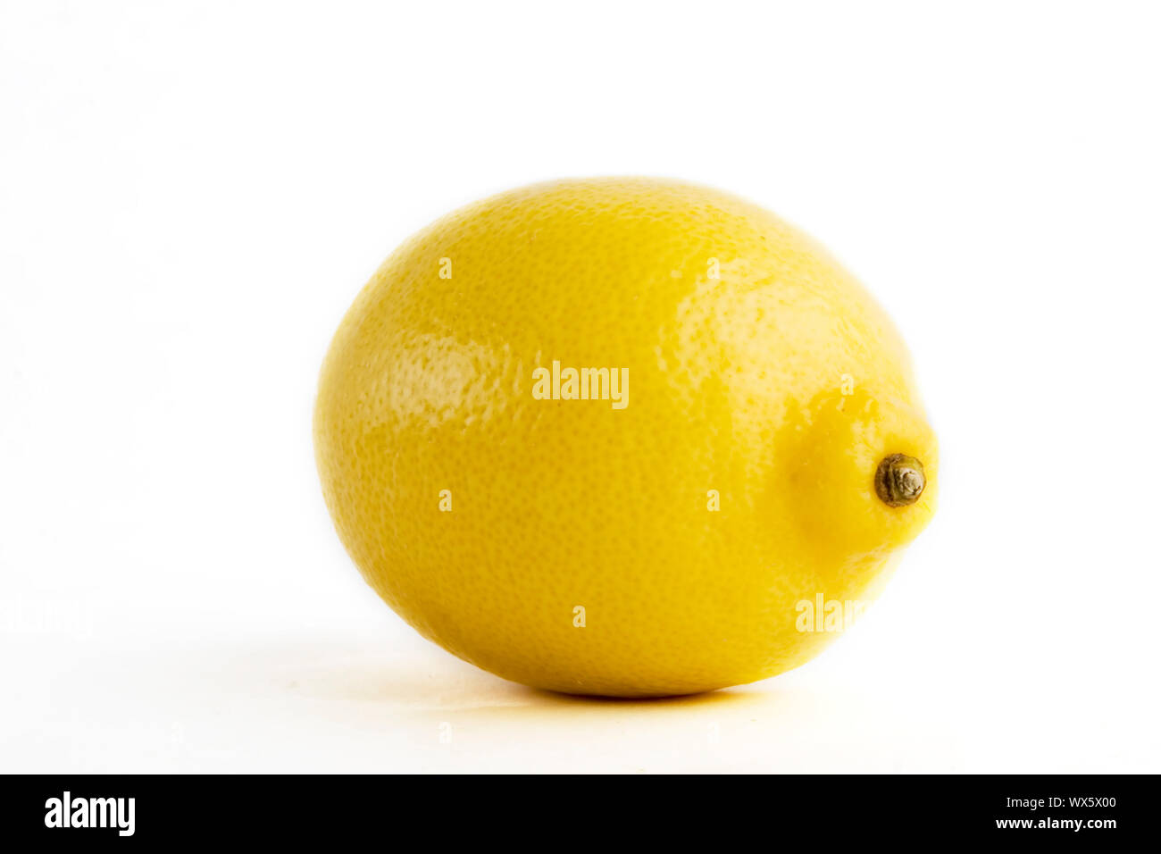 A single lemon isolated on white Stock Photo - Alamy