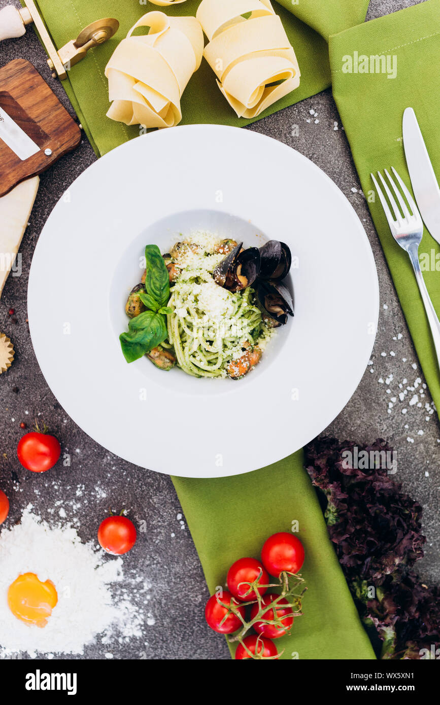 Pasta made of spaghetti on a gray background for advertising the menu ...