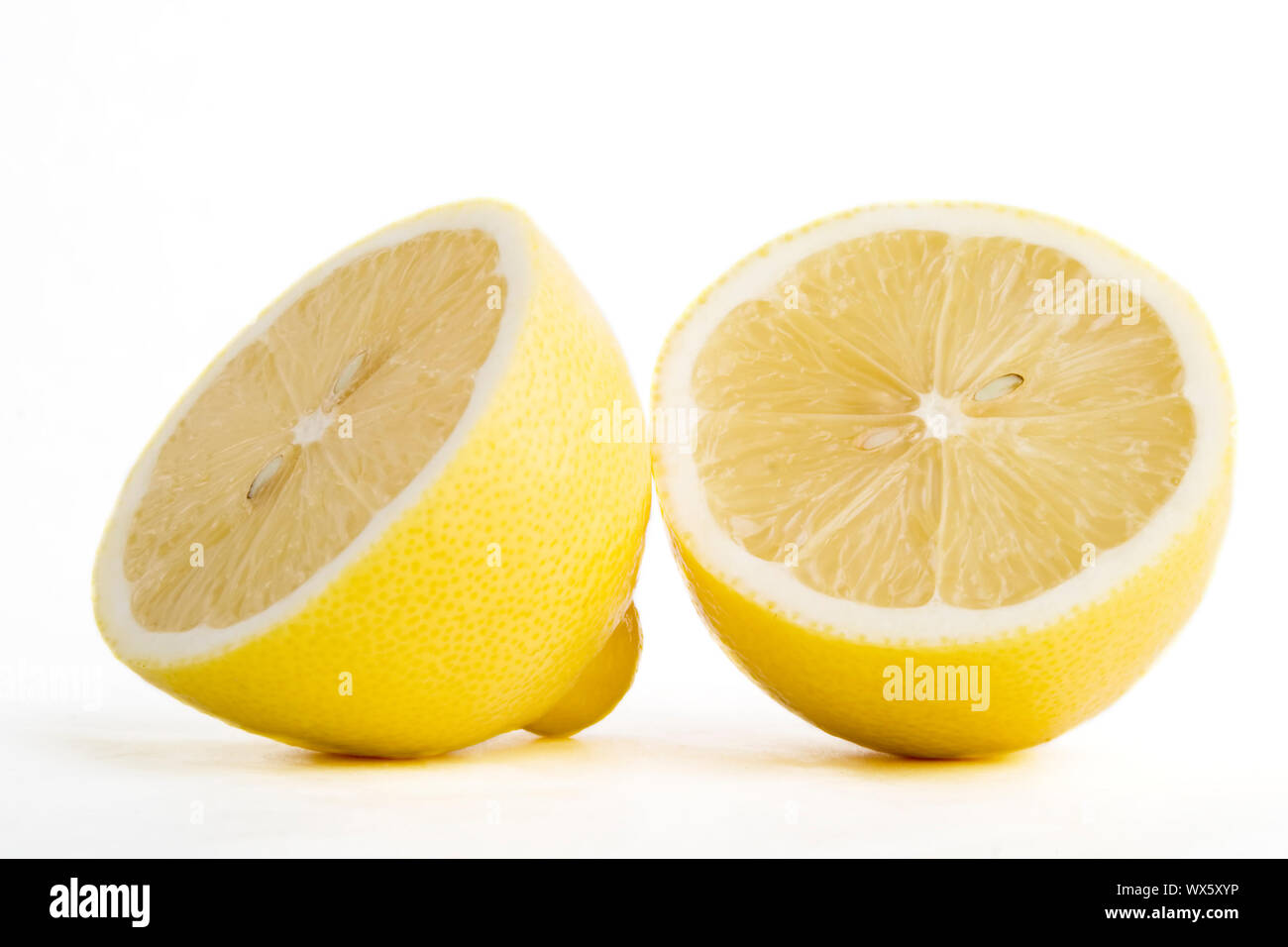 A lemon sliced in half Stock Photo - Alamy