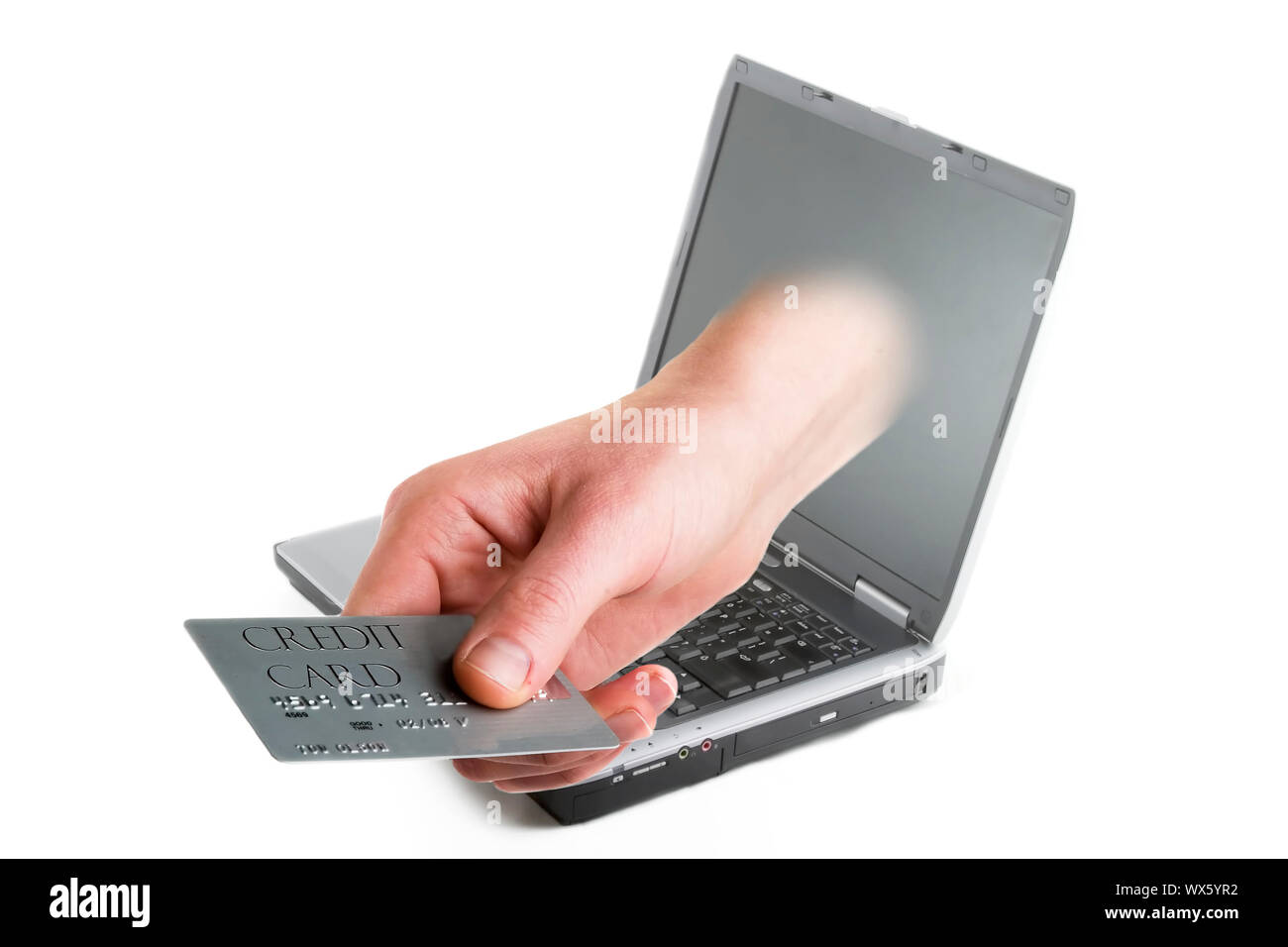 A hand coming out of a computer screen with credit card Stock Photo - Alamy