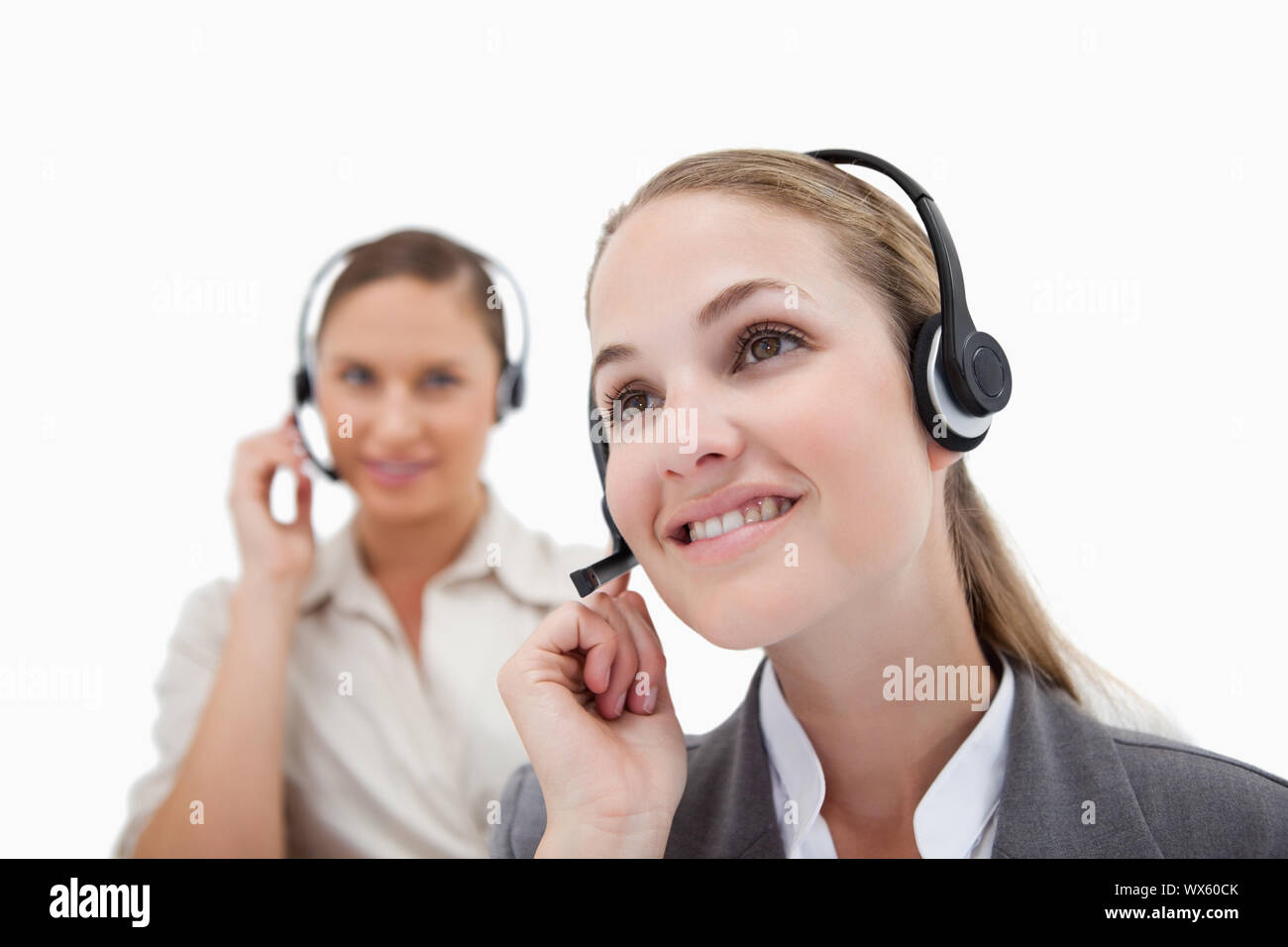 Smiling business people using headsets hi-res stock photography and ...