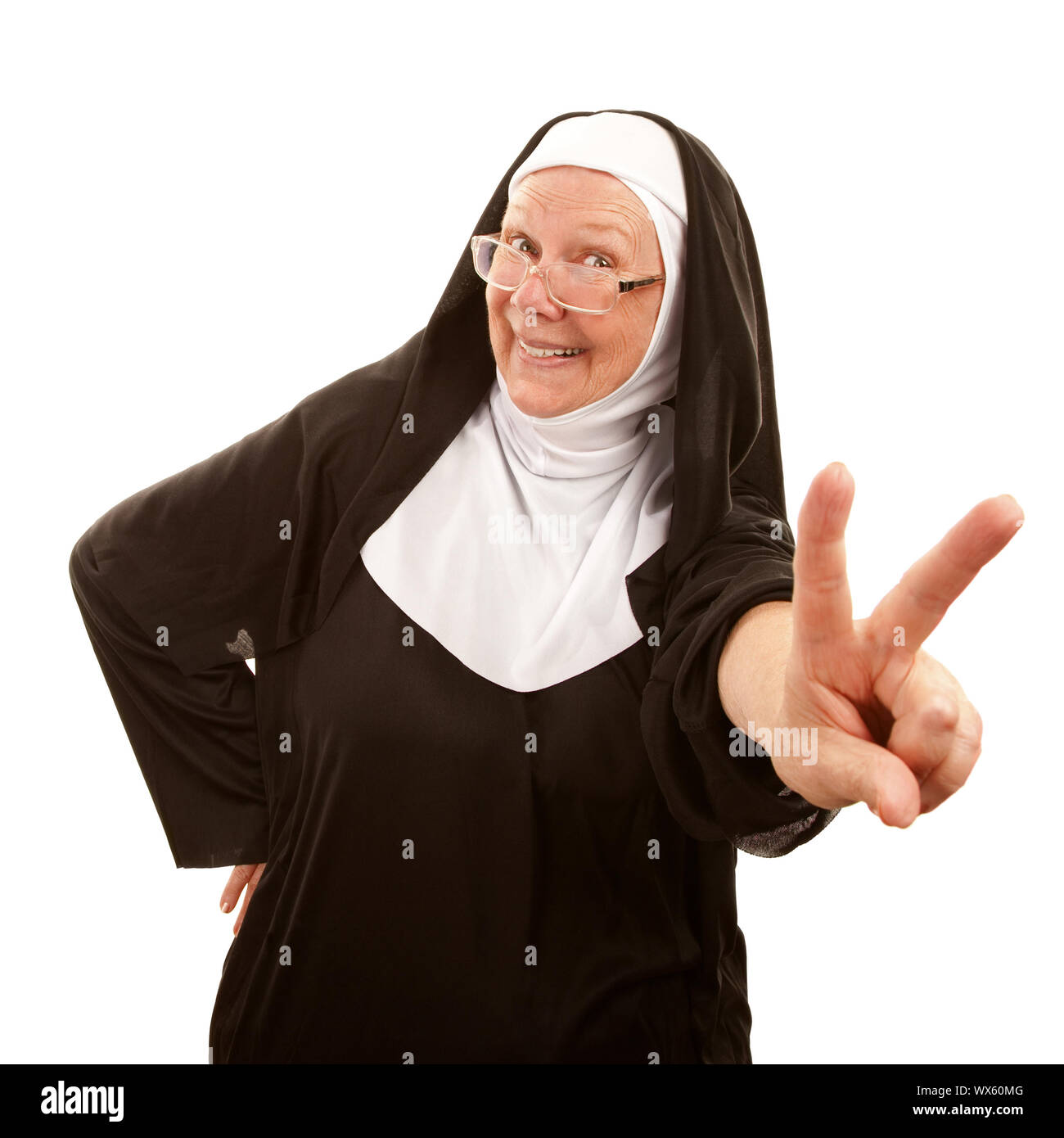 Funny nun making peace sign with her hand Stock Photo - Alamy