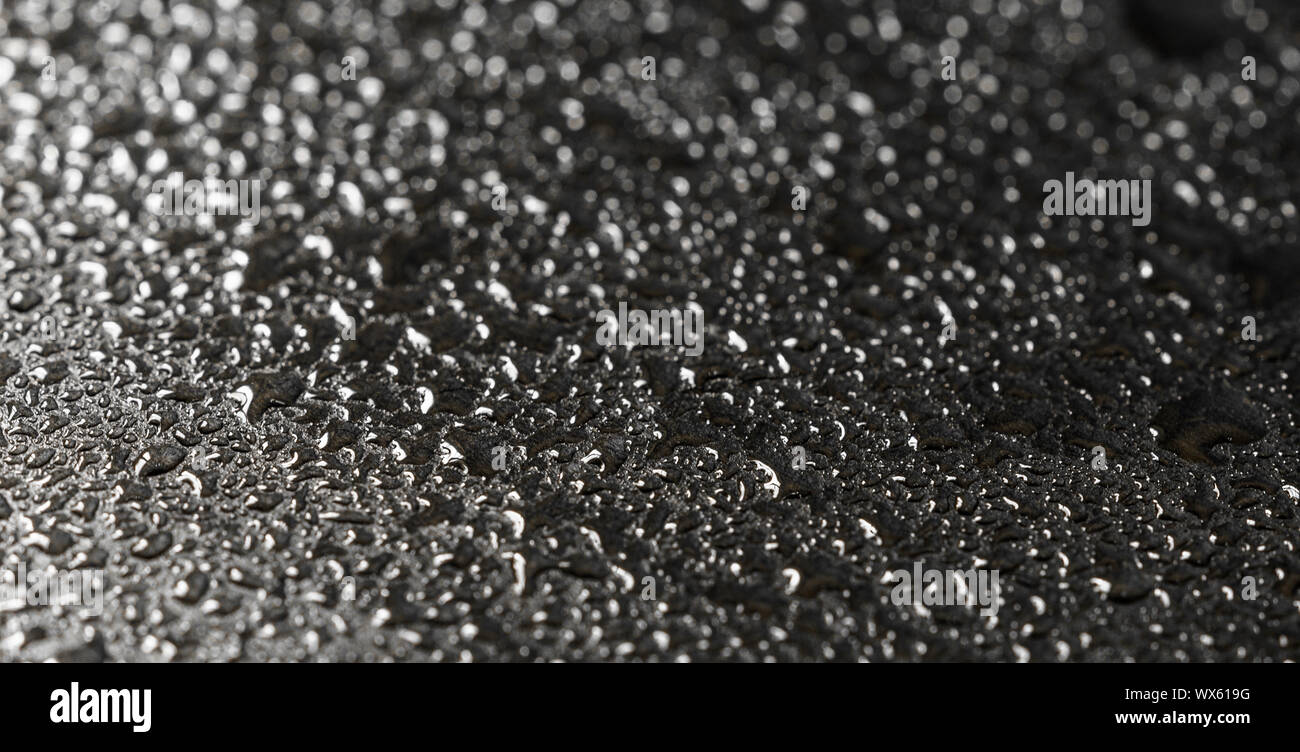 Water drops on a black slate background Stock Photo - Alamy
