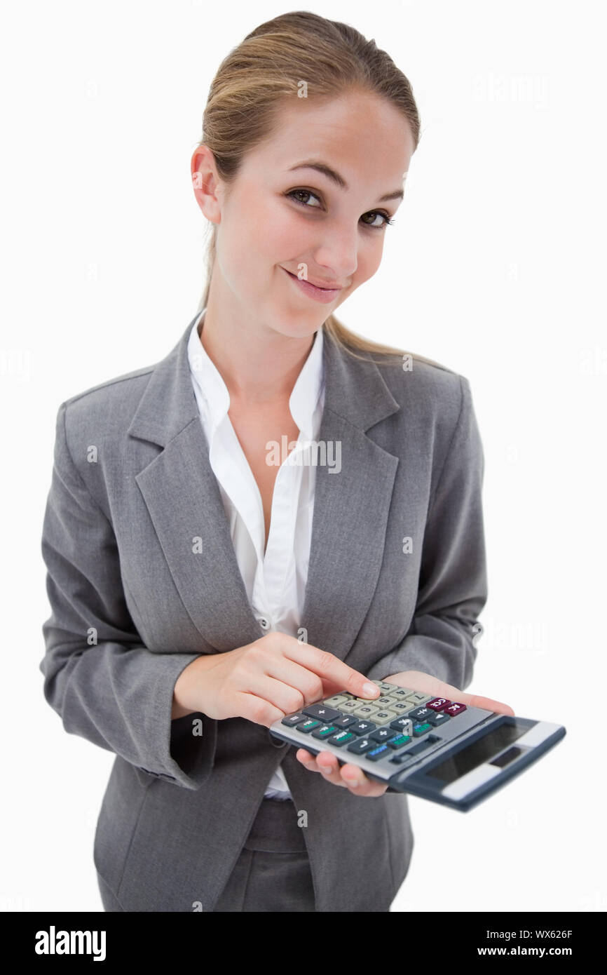 Bank employee with pocket calculator against a white background Stock ...