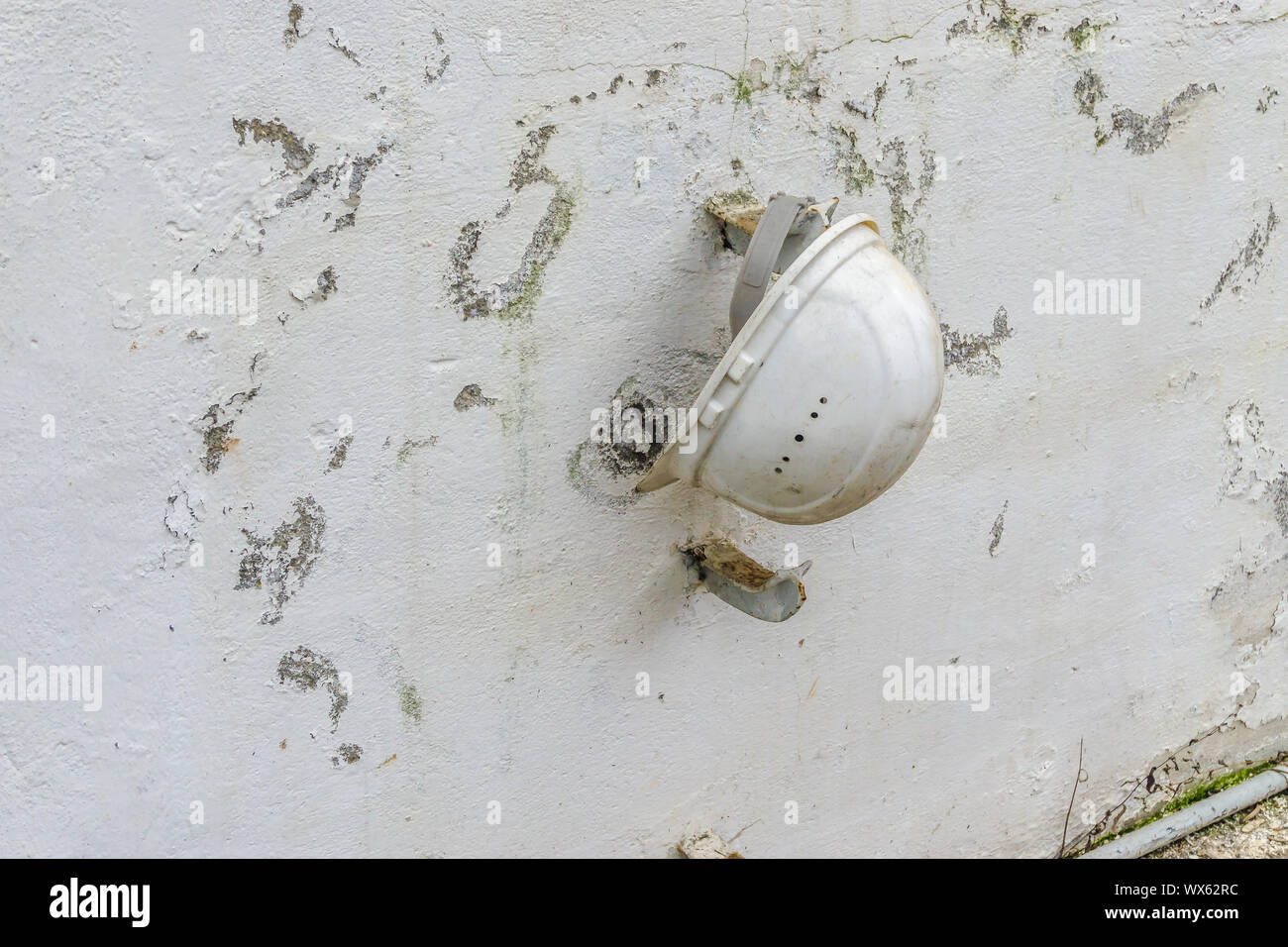 Construction helmet hanging on wall hi-res stock photography and images ...