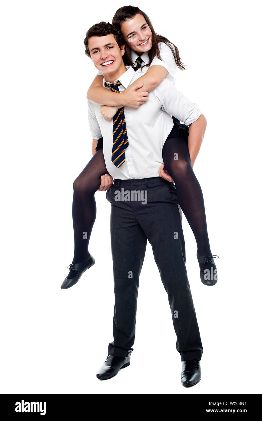 Best friends having fun together, Girl enjoying piggy ride. All against ...