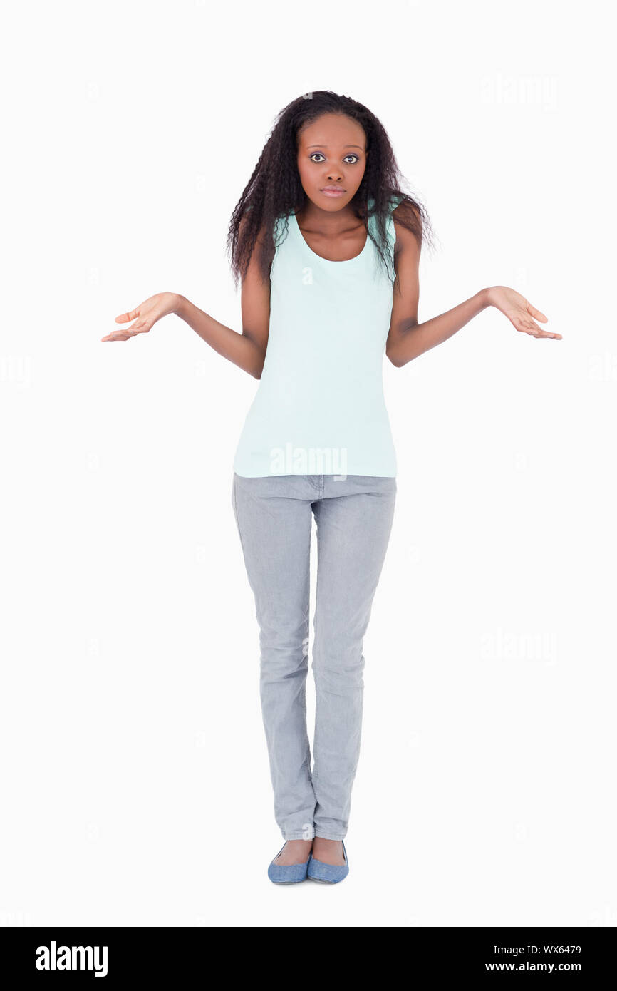 Young african woman confused Cut Out Stock Images & Pictures - Alamy