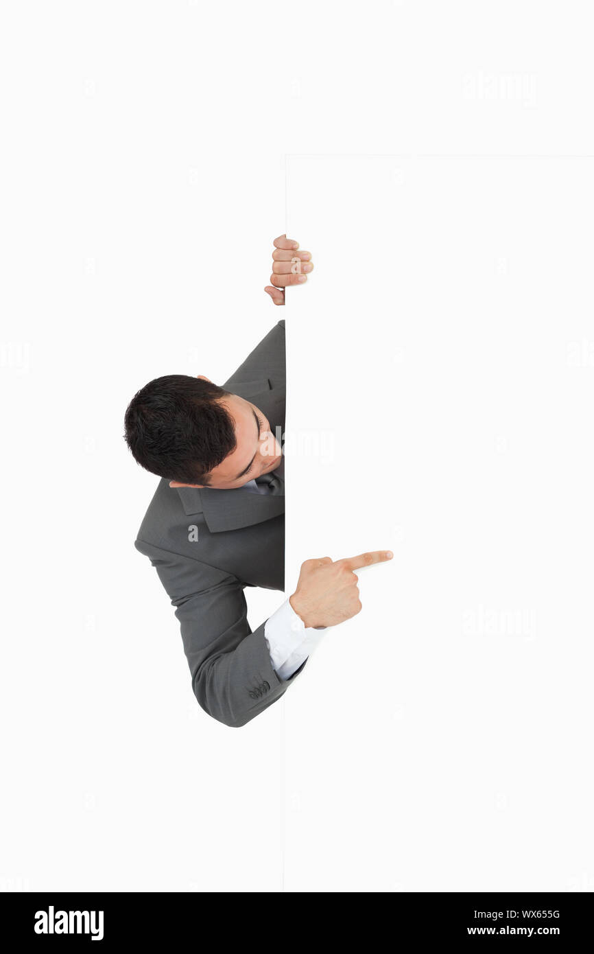 Businessman looking around corner hi-res stock photography and images ...
