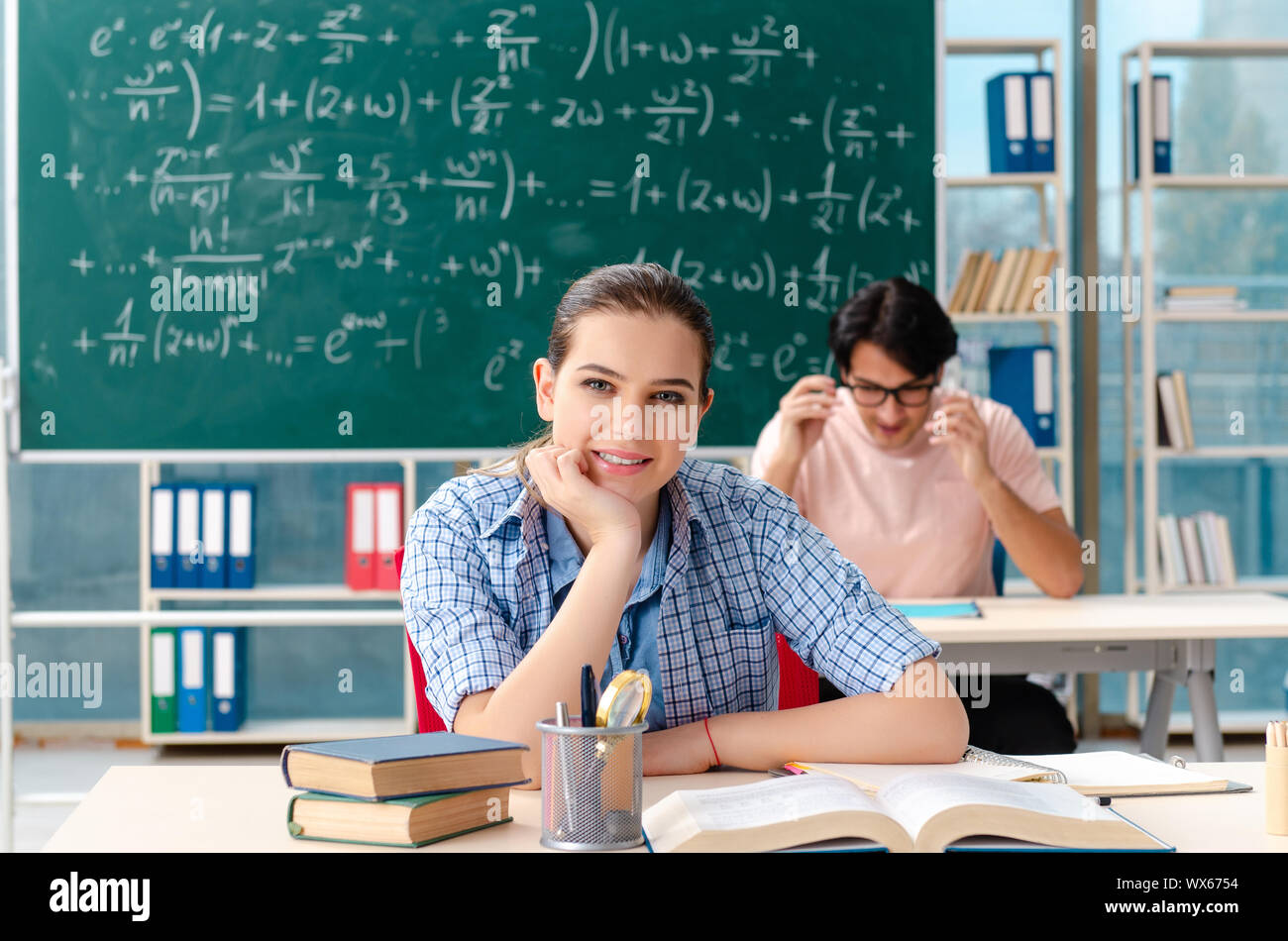 Young students taking the math exam in classroom Stock Photo - Alamy