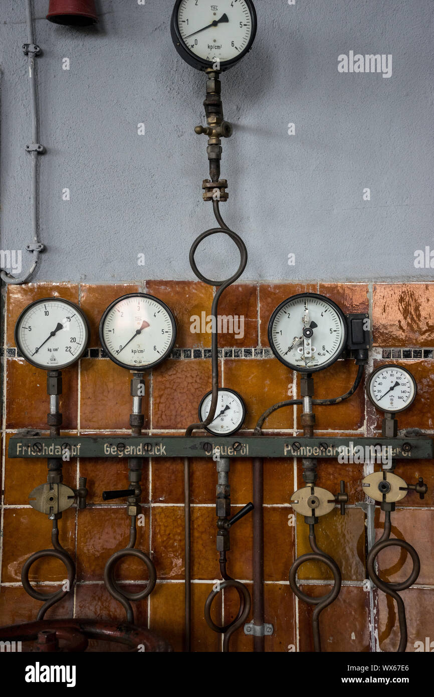 Messure Tools in aTurbine hall of a briquette factory Stock Photo - Alamy