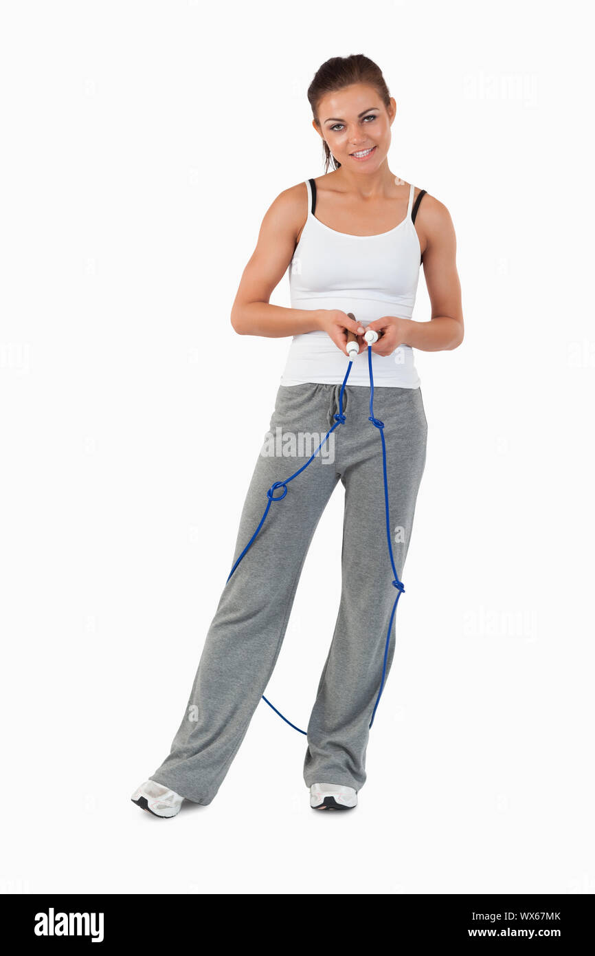 Young female with her rope against a white background Stock Photo - Alamy