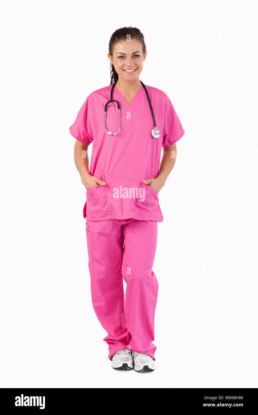 Portrait of a nurse standing up against a white background Stock Photo ...