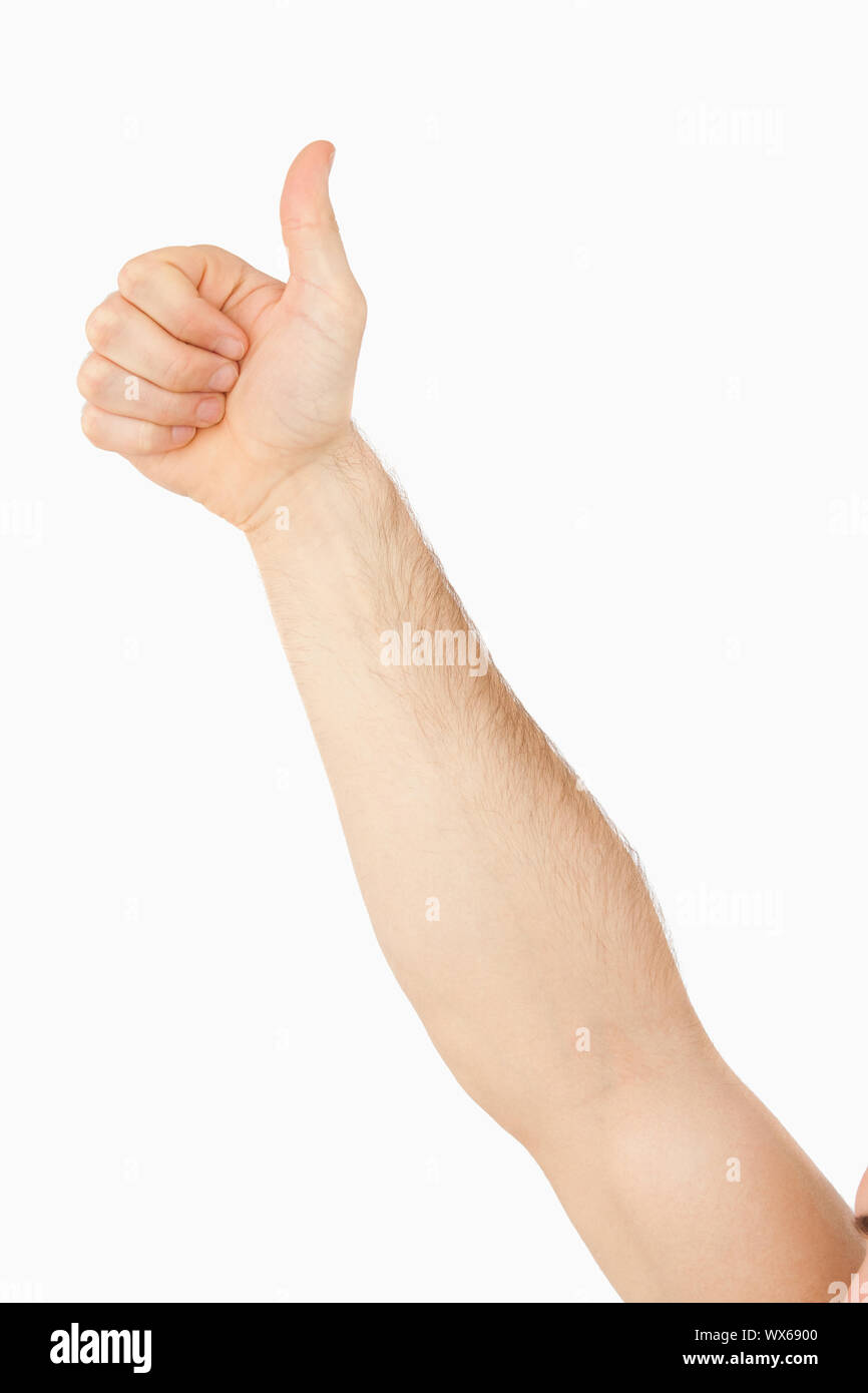 Side view of male arm giving thumb up against a white background Stock ...
